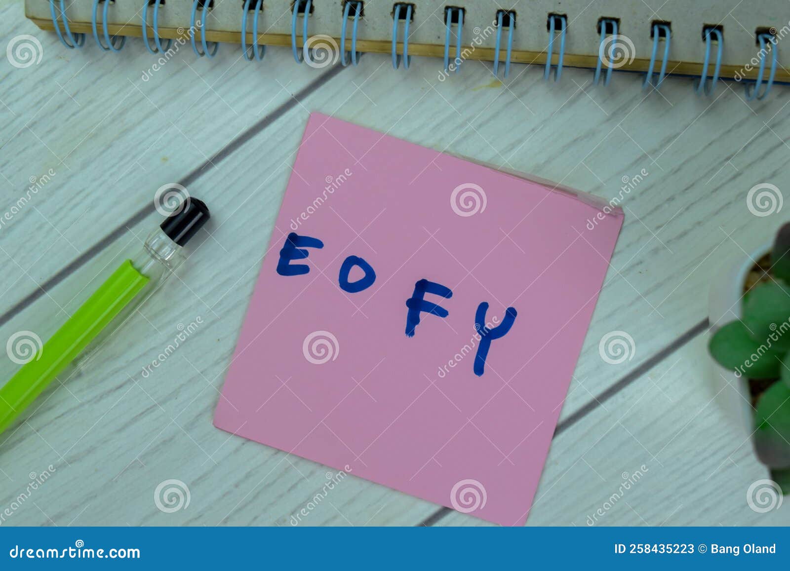 Concept of EOFY Write on Sticky Notes Isolated on Wooden Table Stock ...