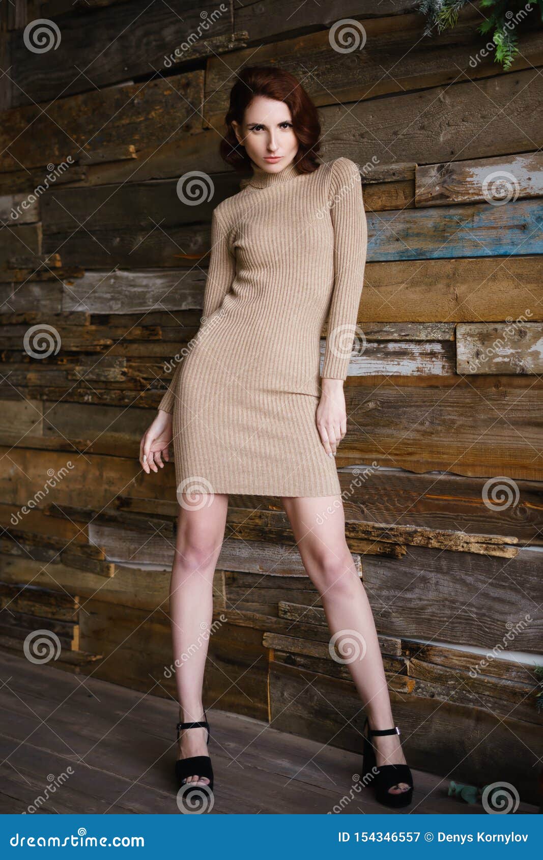 Pretty Redhead Thin Lean Young Woman With Vintage Hairdo Posing In Knit