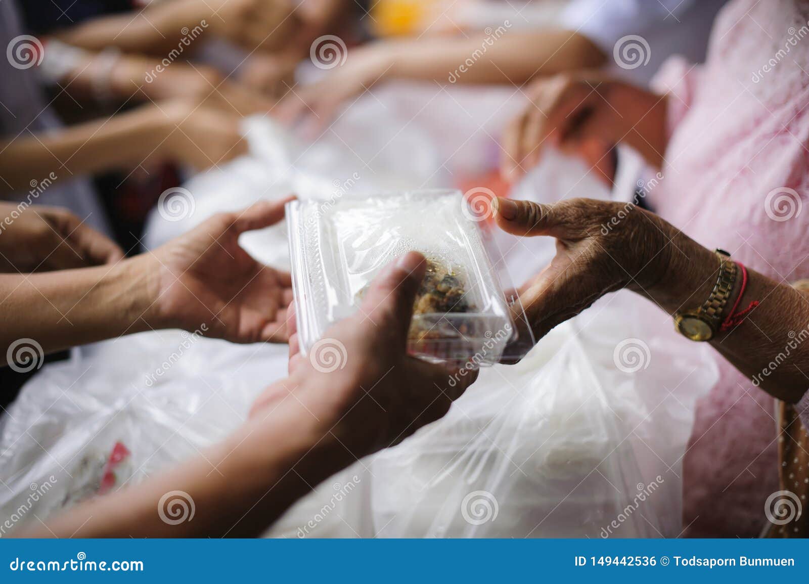The Concept of Feeding : the Hands of the Poor Receive Food from the ...