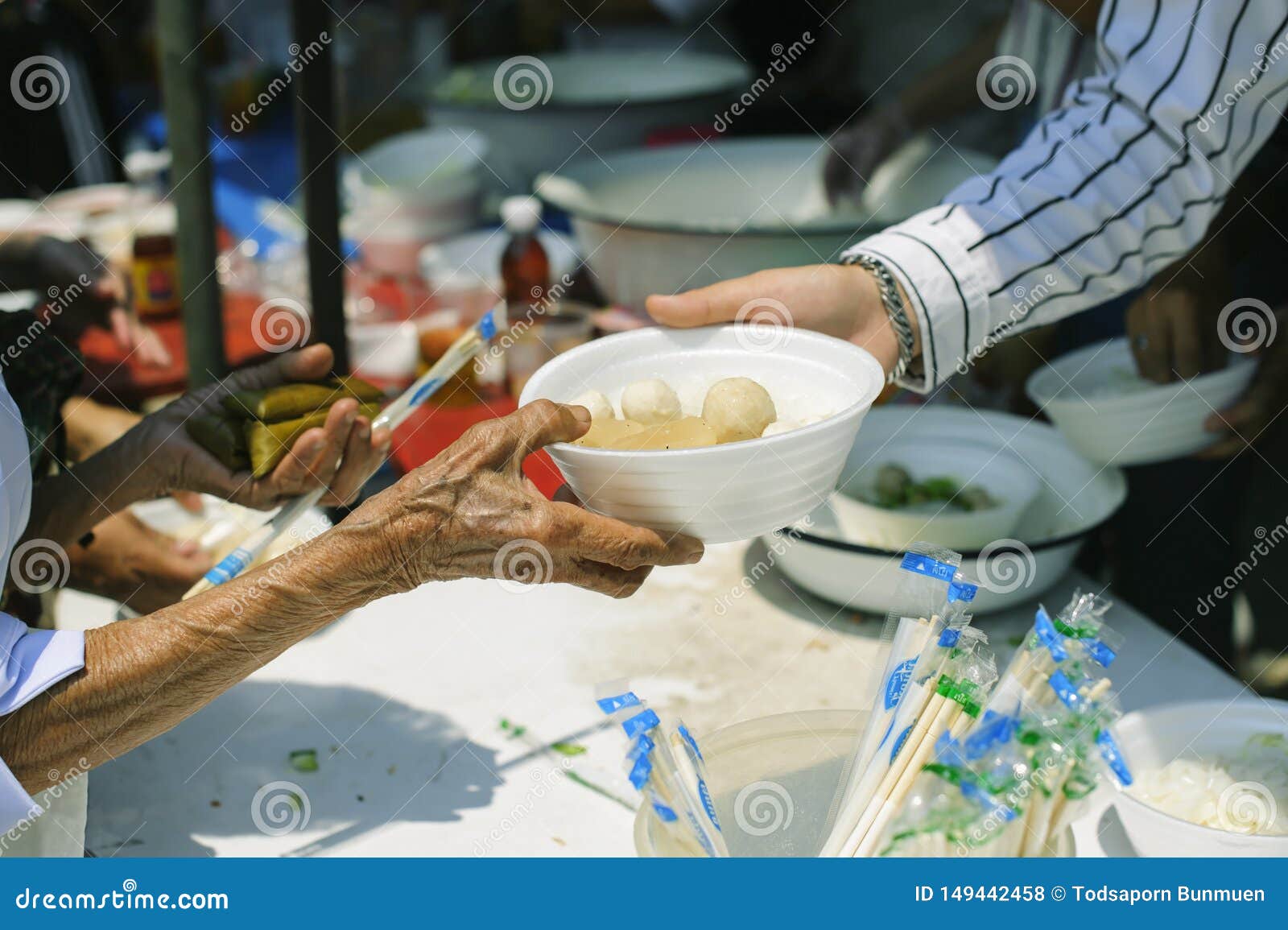 The Concept of Feeding : the Hands of the Poor Receive Food from the ...