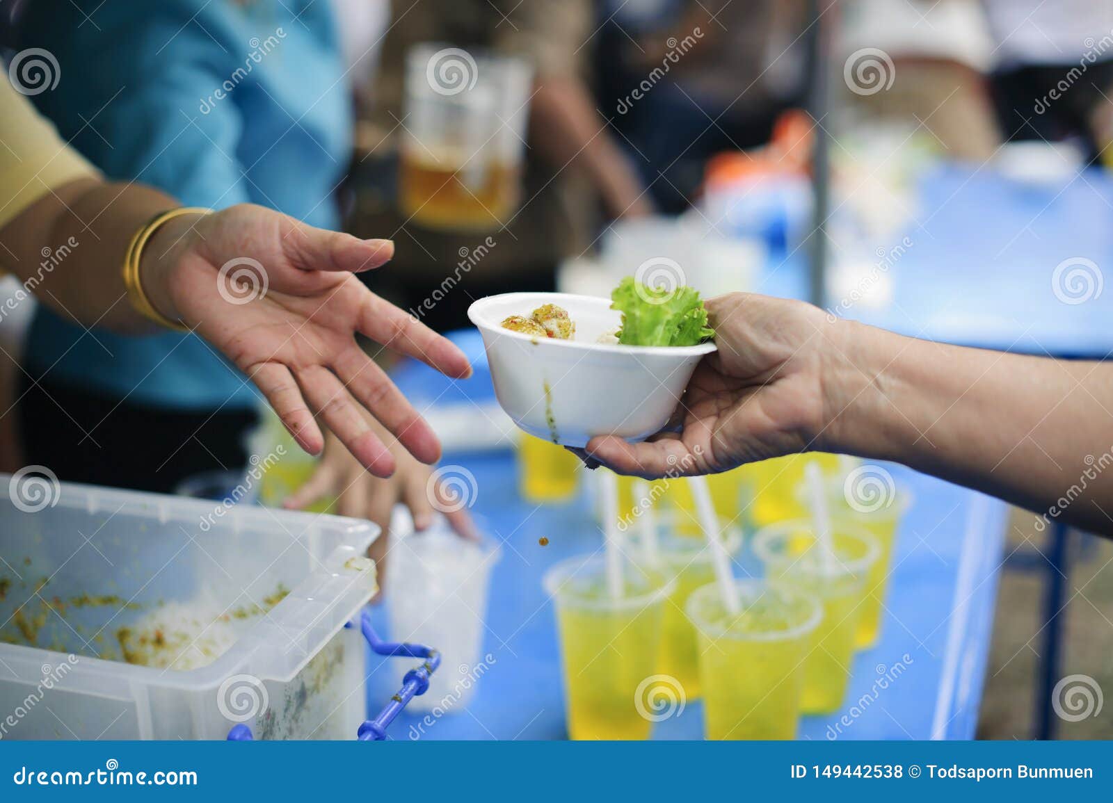 The Concept of Feeding : the Hands of the Poor Receive Food from the ...