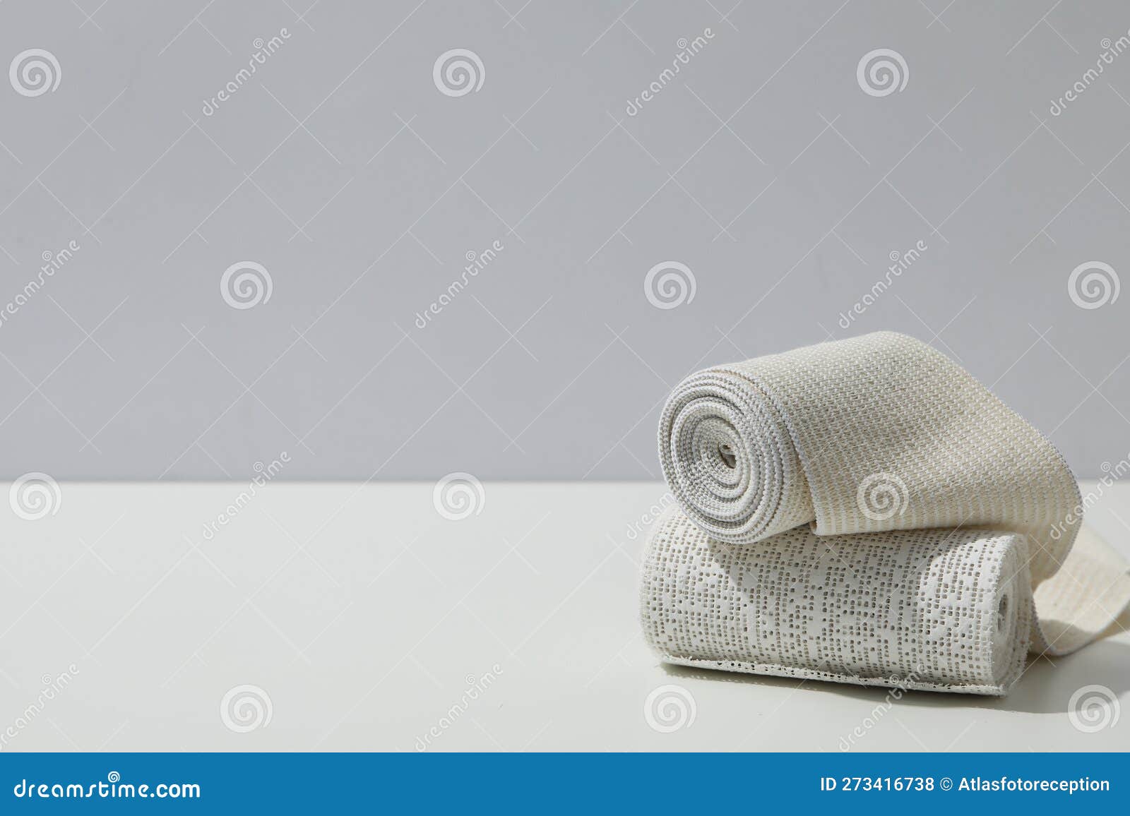 Concept of First Aid, Different Bandage on White Table Stock Photo ...
