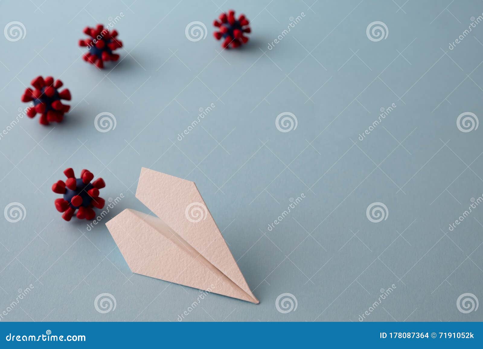 Concept of Fly Danger. Paper Plane and Models of Covid-19 Virus on Blue ...