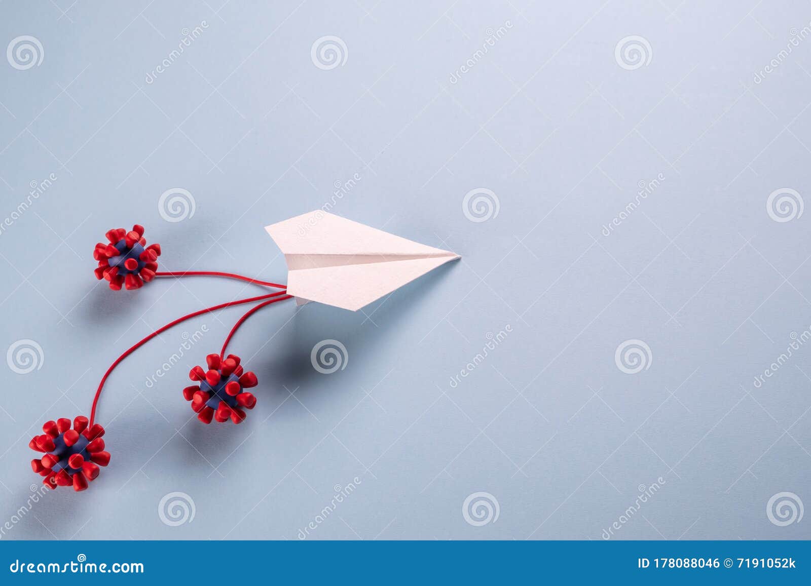 Concept of Fly Danger. Paper Plane and Models of Covid-19 Virus on Blue ...