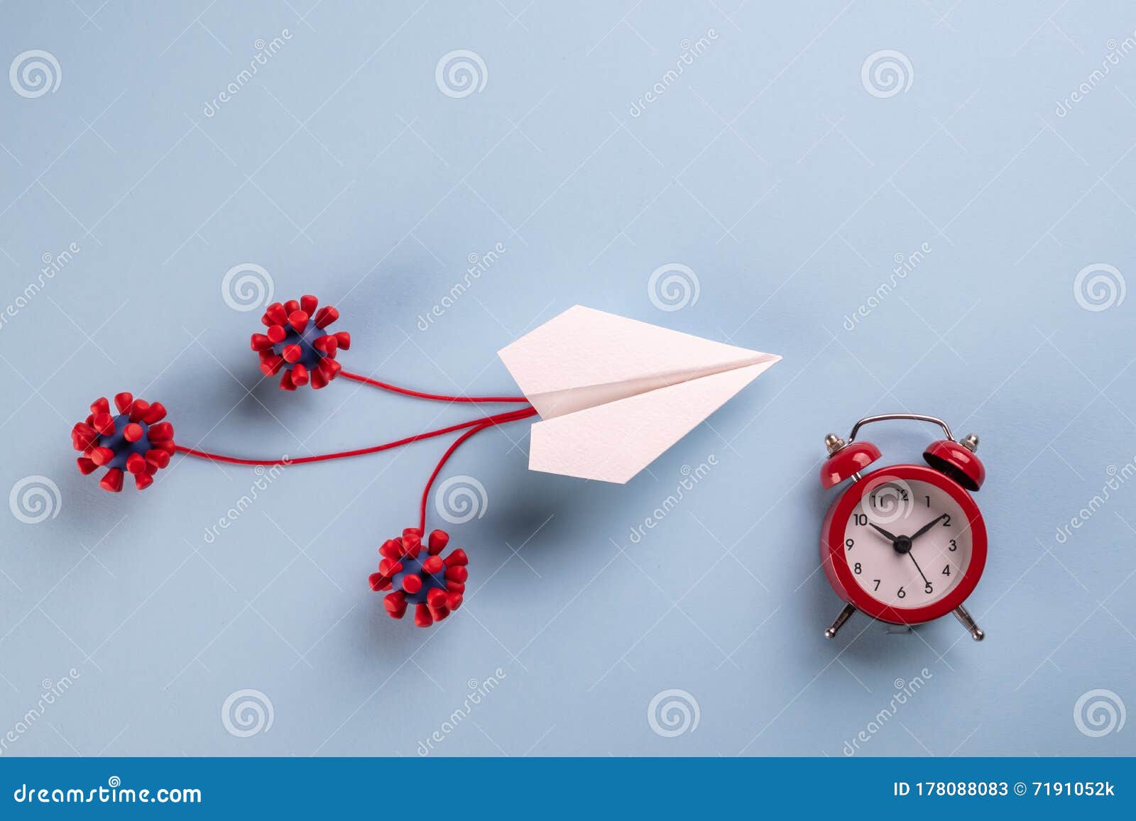 Concept of Fly Danger. Paper Plane and Models of Covid-19 Virus on Blue ...
