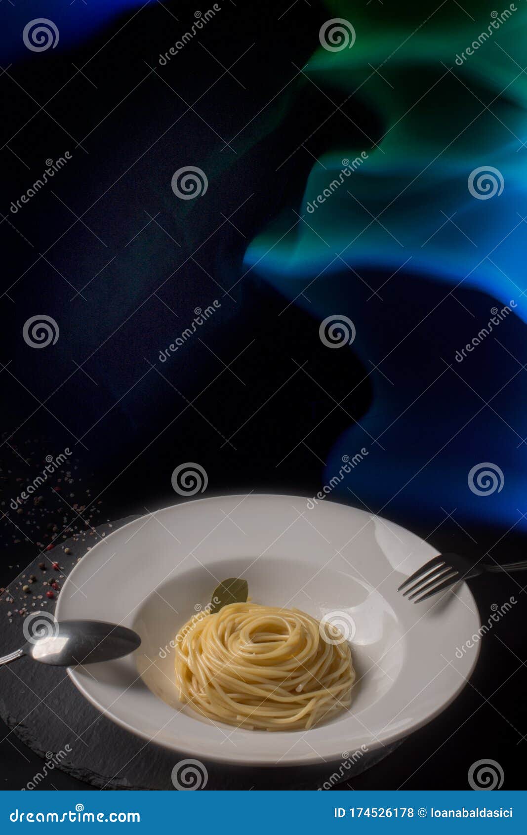 Concept of Food with Spaghetti on Lightpainting Background Stock Photo ...