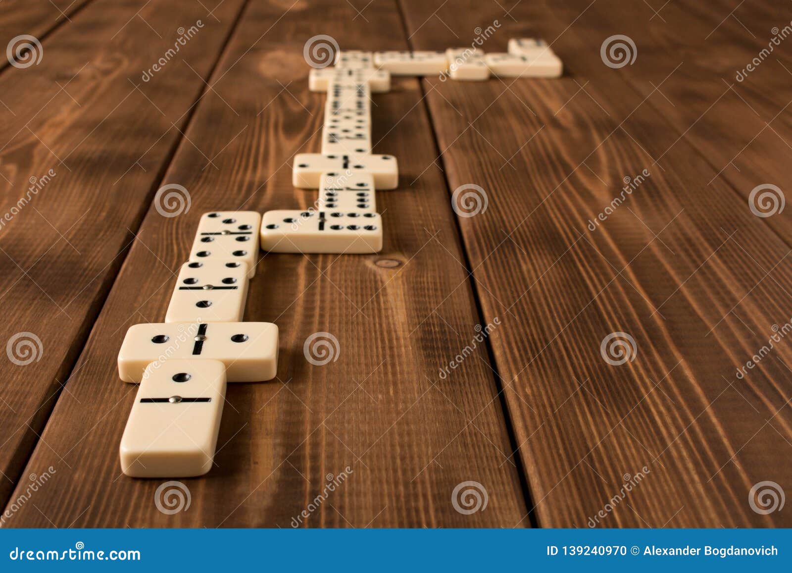 The Concept of Games of Dominoes. Playing Dominoes on a Wooden Table ...