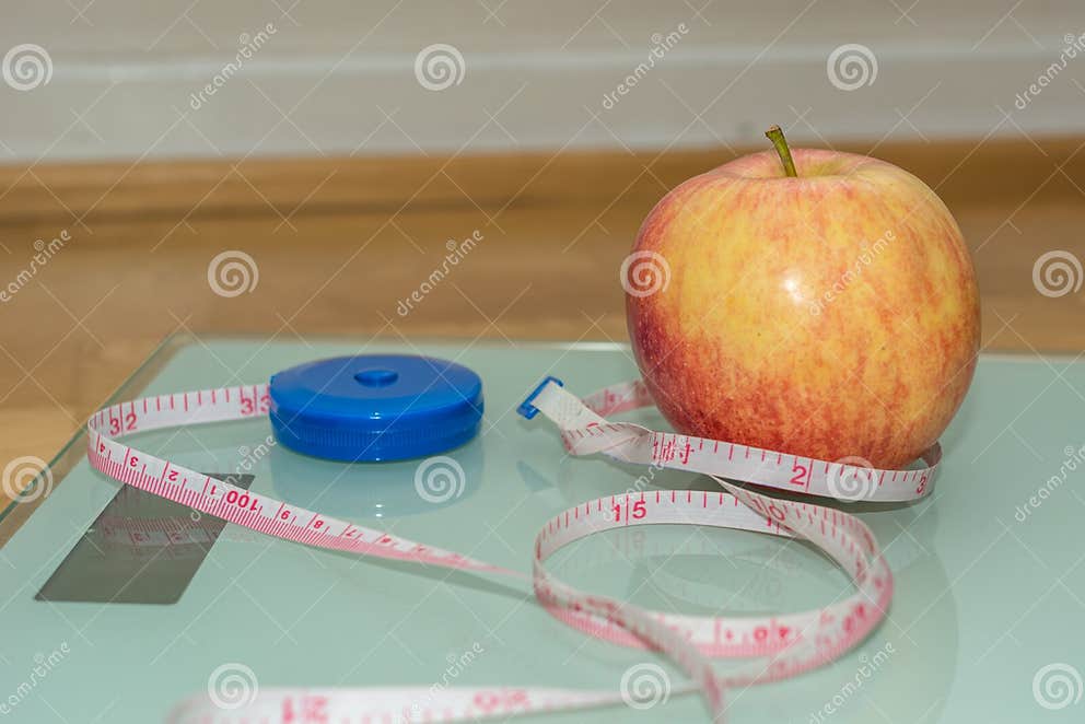 Concept - Getting in Shape, Measuring Tape, Apple, Scale Stock Photo ...