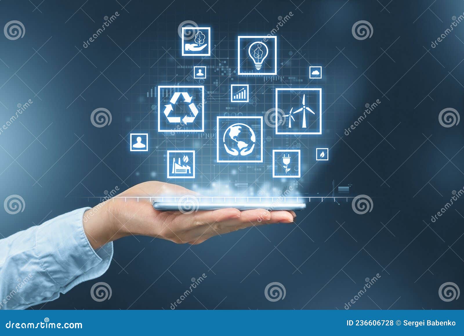 Concept of a Hand Holding a Smartphone with Ecological Technologies for ...