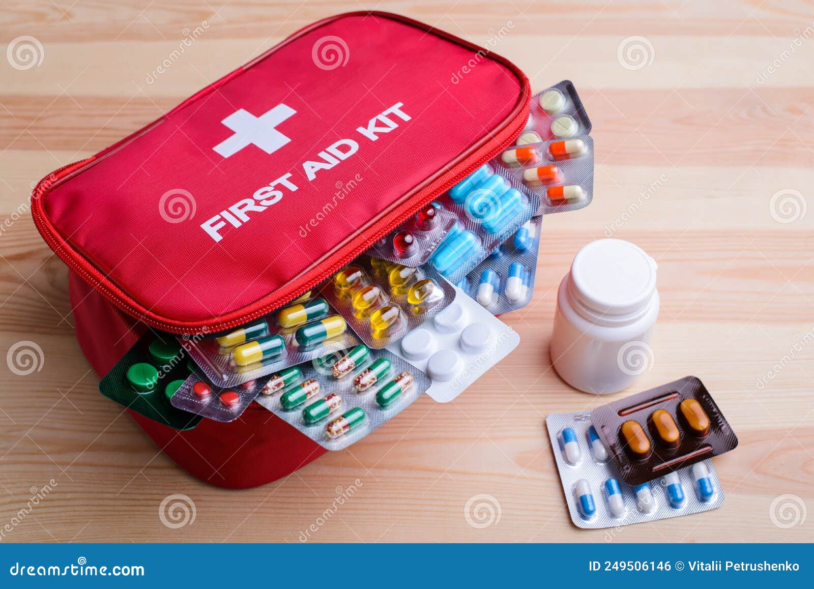 Full Equipped First Aid Kit With Pills And Other Medicine Lays On