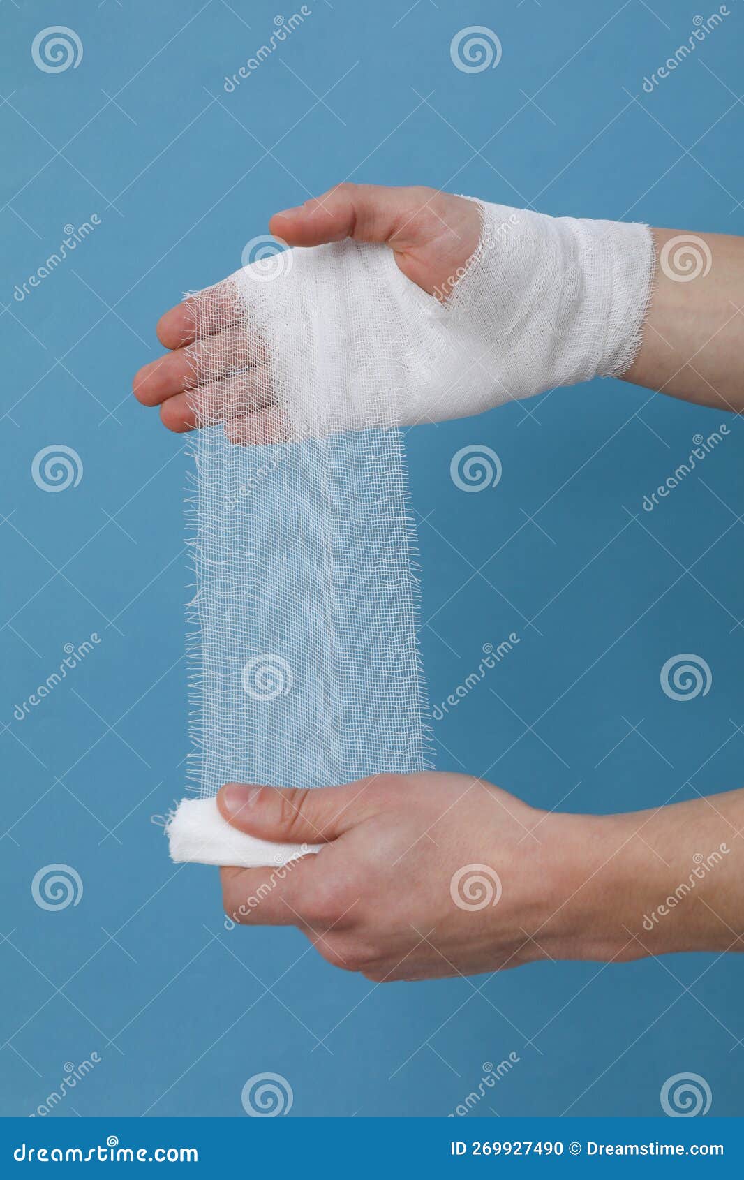 Concept of Help during an Injury, Man Wrapping Hand in Bandage on Blue ...
