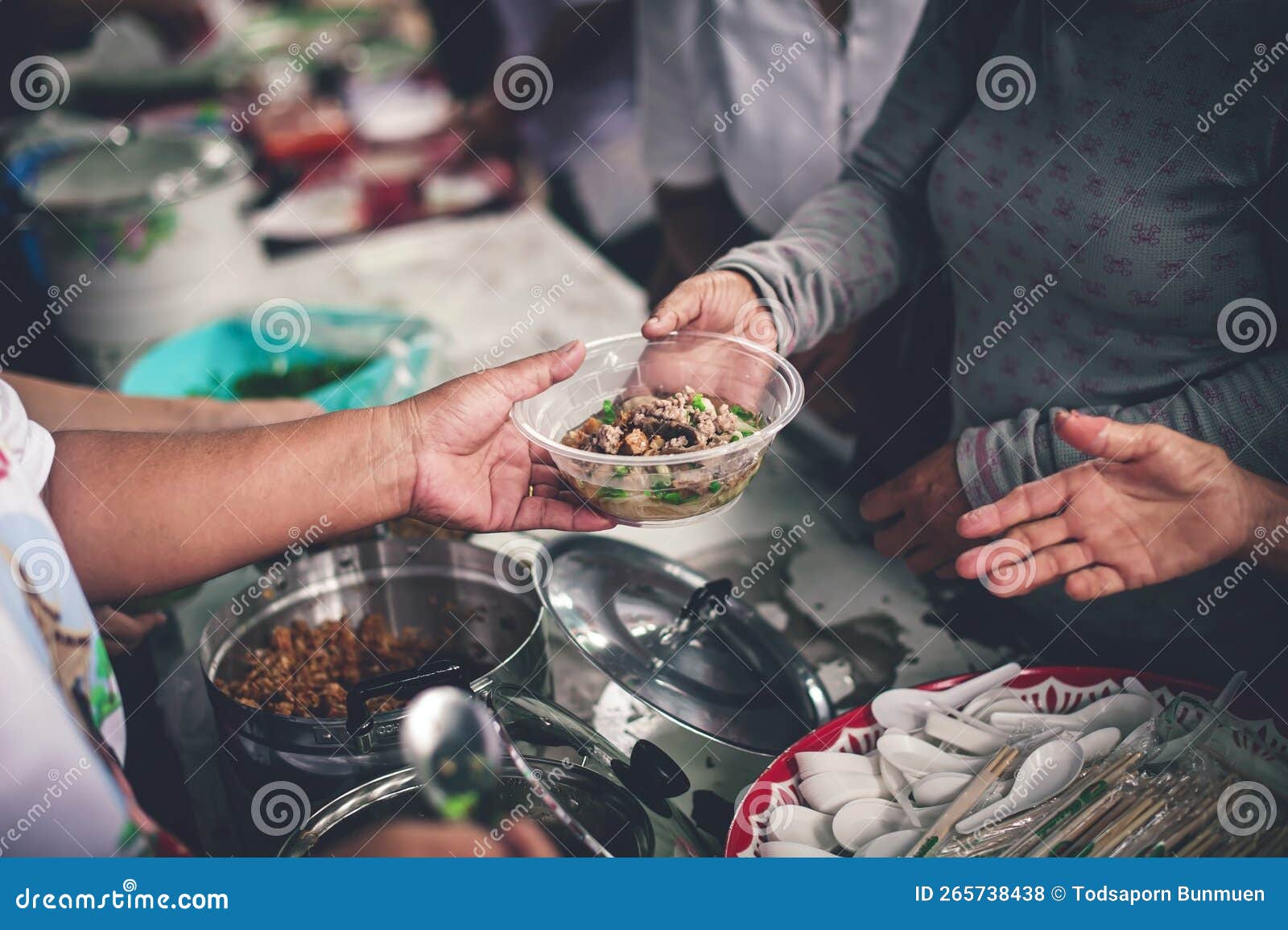 The Concept of Humanitarian Assistance: Sharing Food To the Poor Stock ...