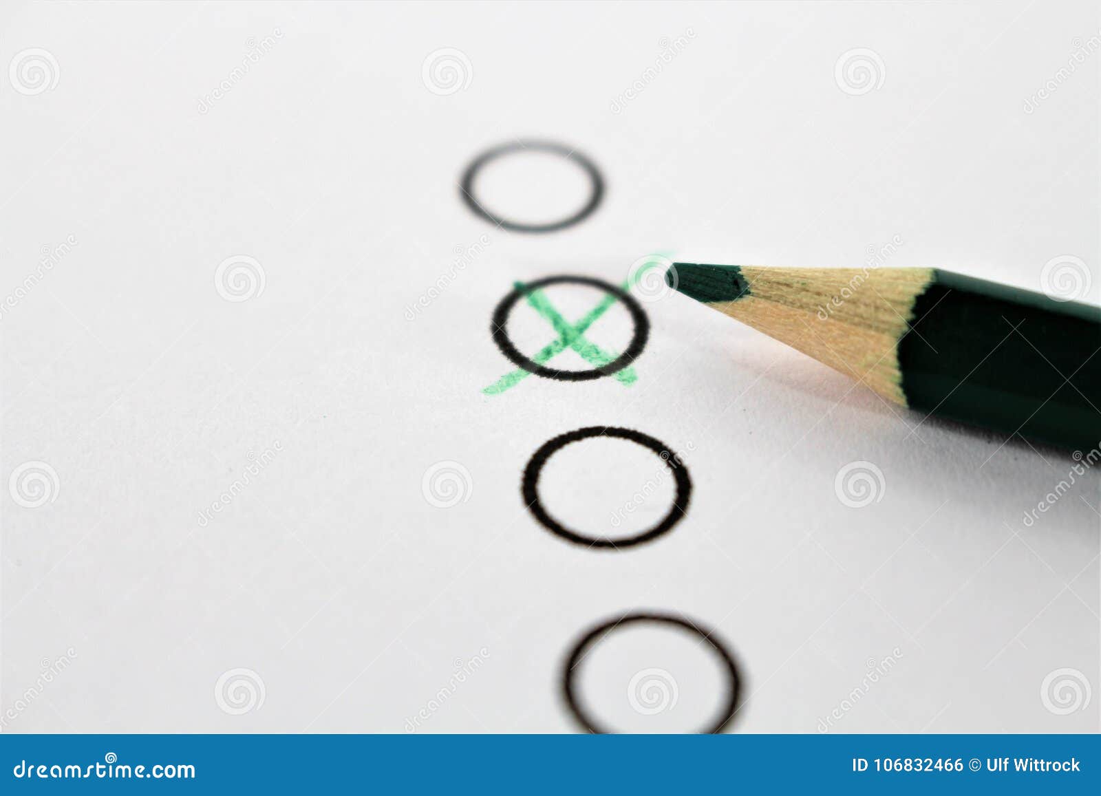 An Concept Image of a Green Pencil and a Questionnaire Stock Photo ...