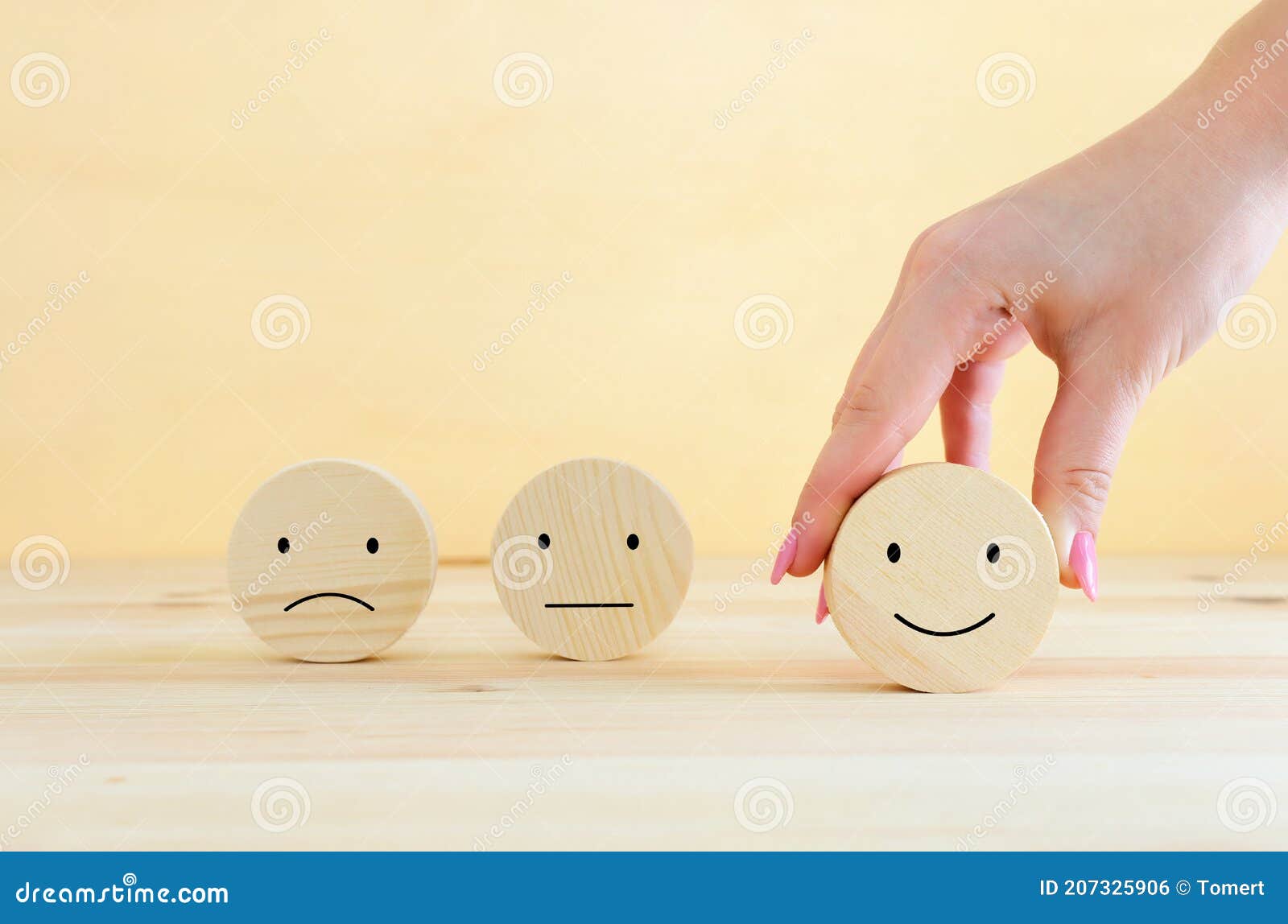 Concept Image of Satisfaction Level. Wooden Circles with Emotions Stock ...