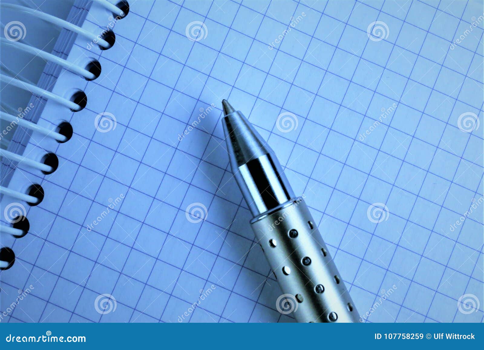 An Concept Image of a Spiral Notebook with a Pen and Copy Space Stock ...