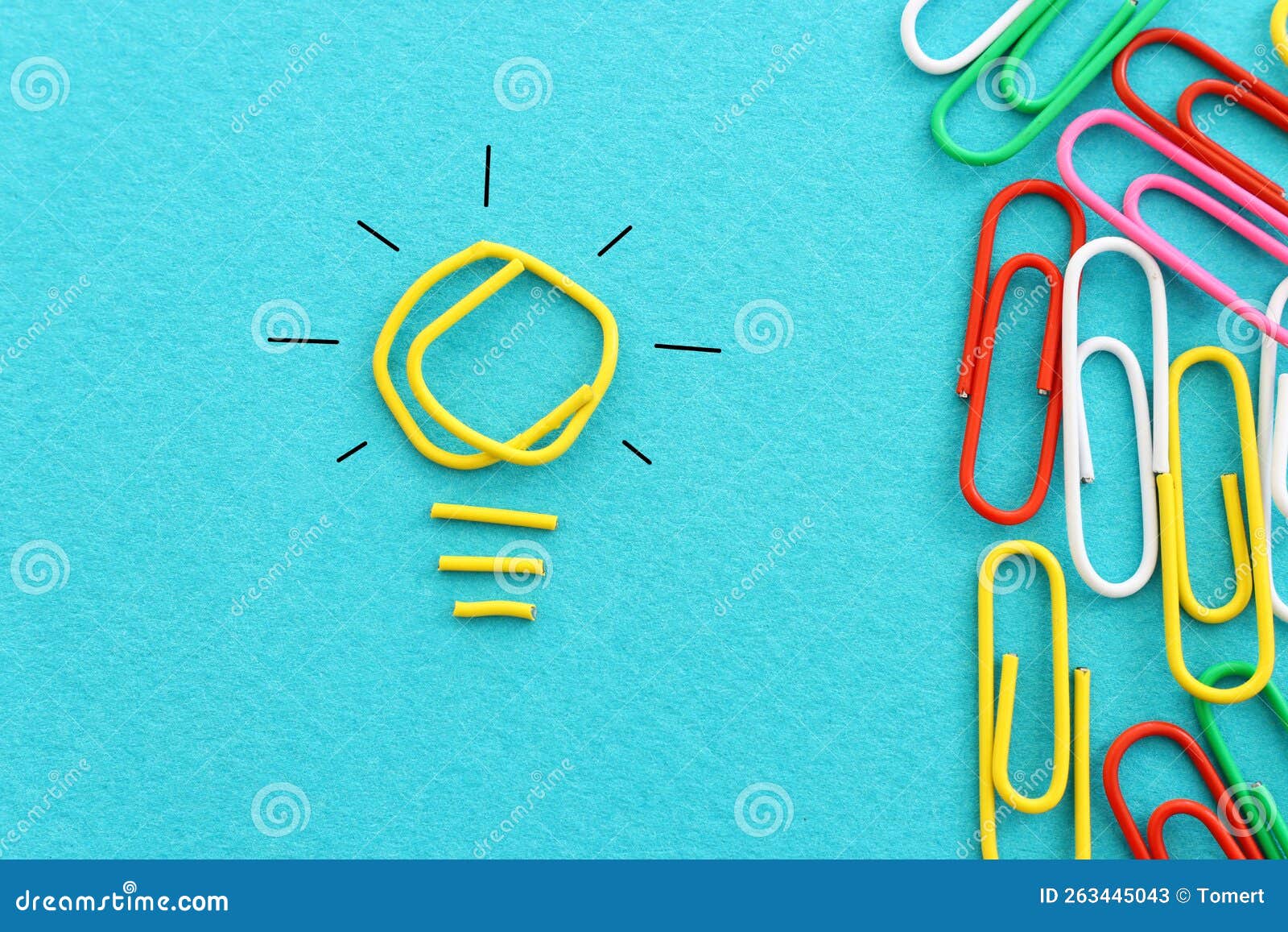 Concept Image of Unique Thinking. Paper Clips in the Shape of Light ...