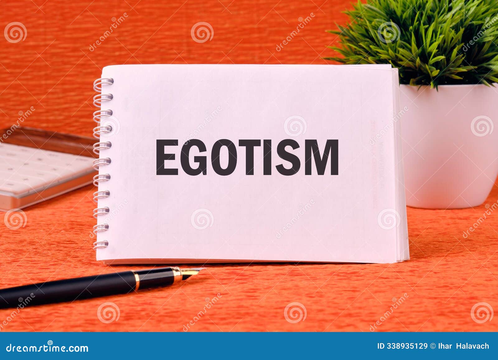 Concept Image. the Word EGOTISM on a Blank Notepad Page on an Orange ...