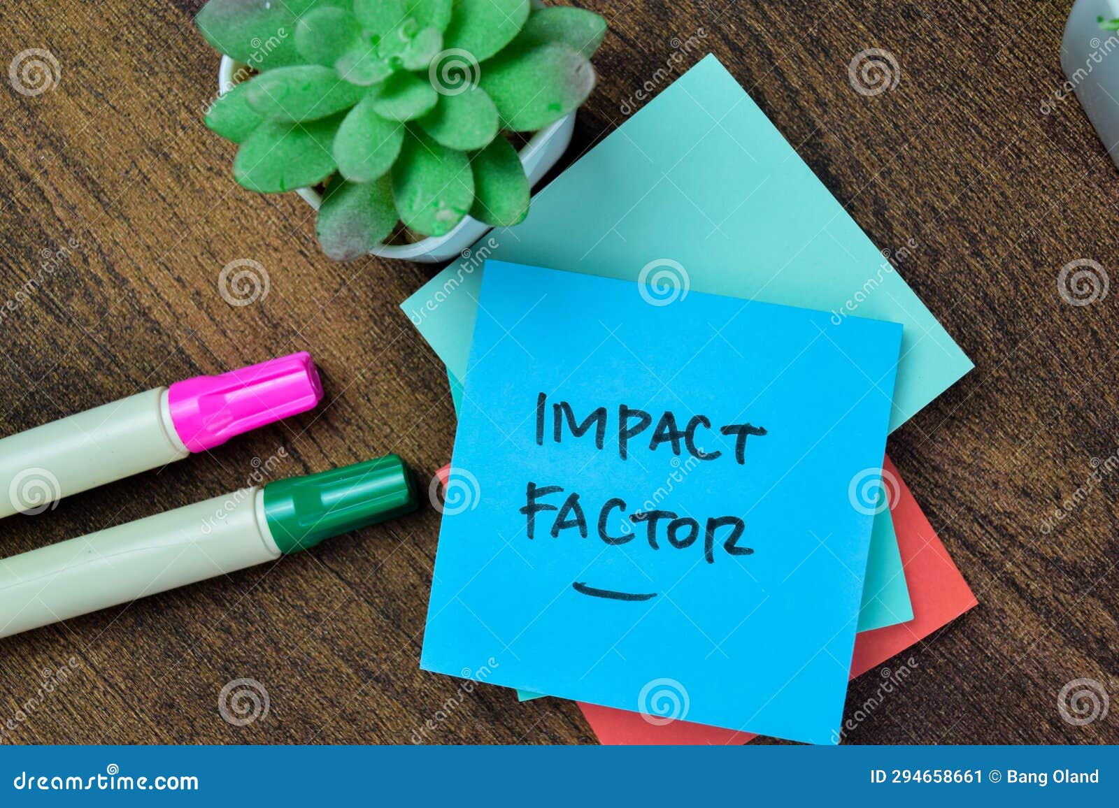Concept of Impact Factor Write on Sticky Notes Isolated on Wooden Table ...