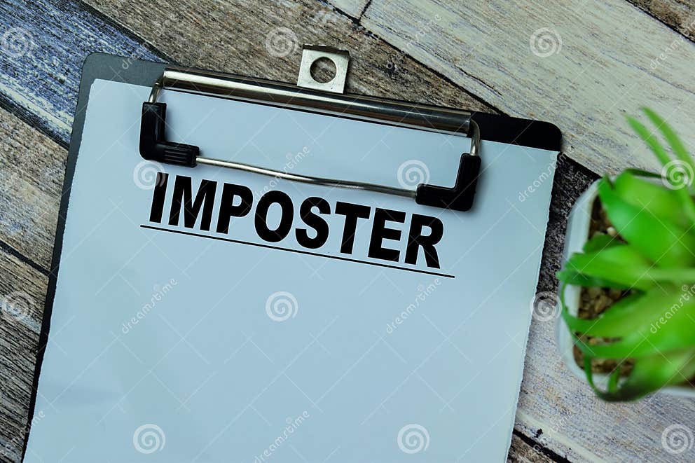 Concept of Imposter Write on Paperwork Isolated on Wooden Table Stock ...