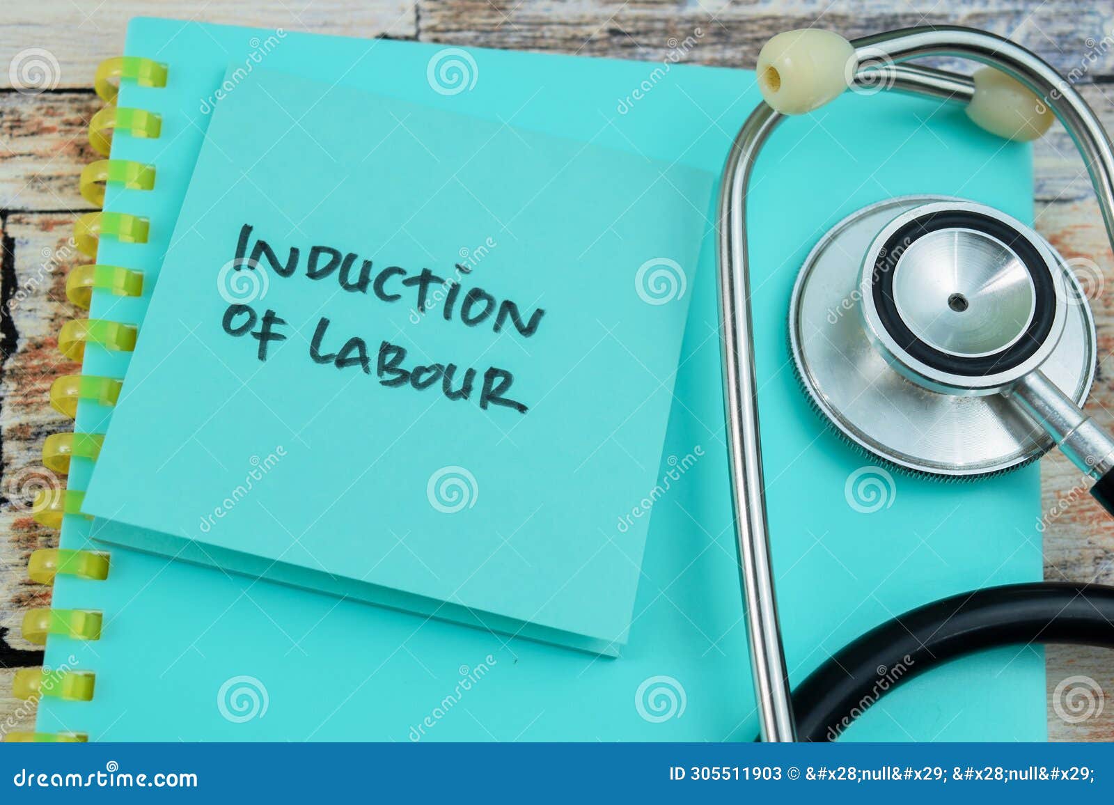 Concept of Induction of Labour Write on Sticky Notes Isolated on Wooden ...