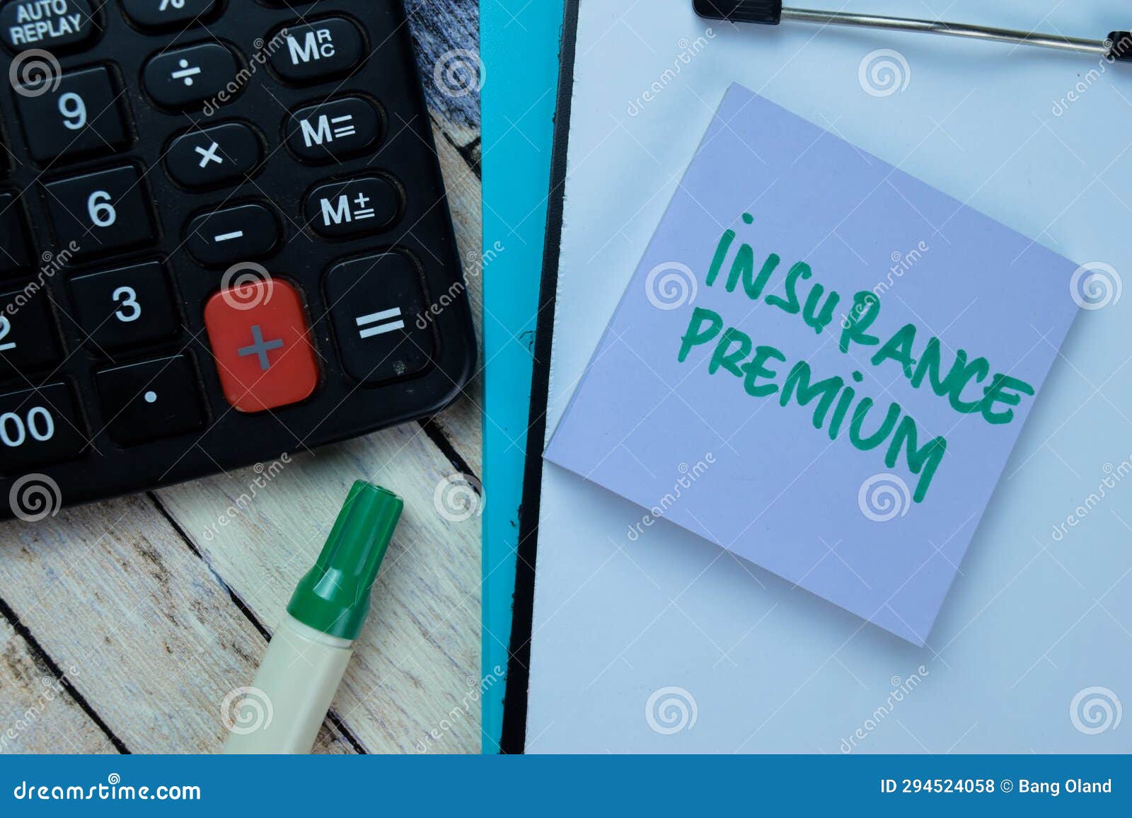 Concept of Insurance Premium Write on Sticky Notes Isolated on Wooden ...