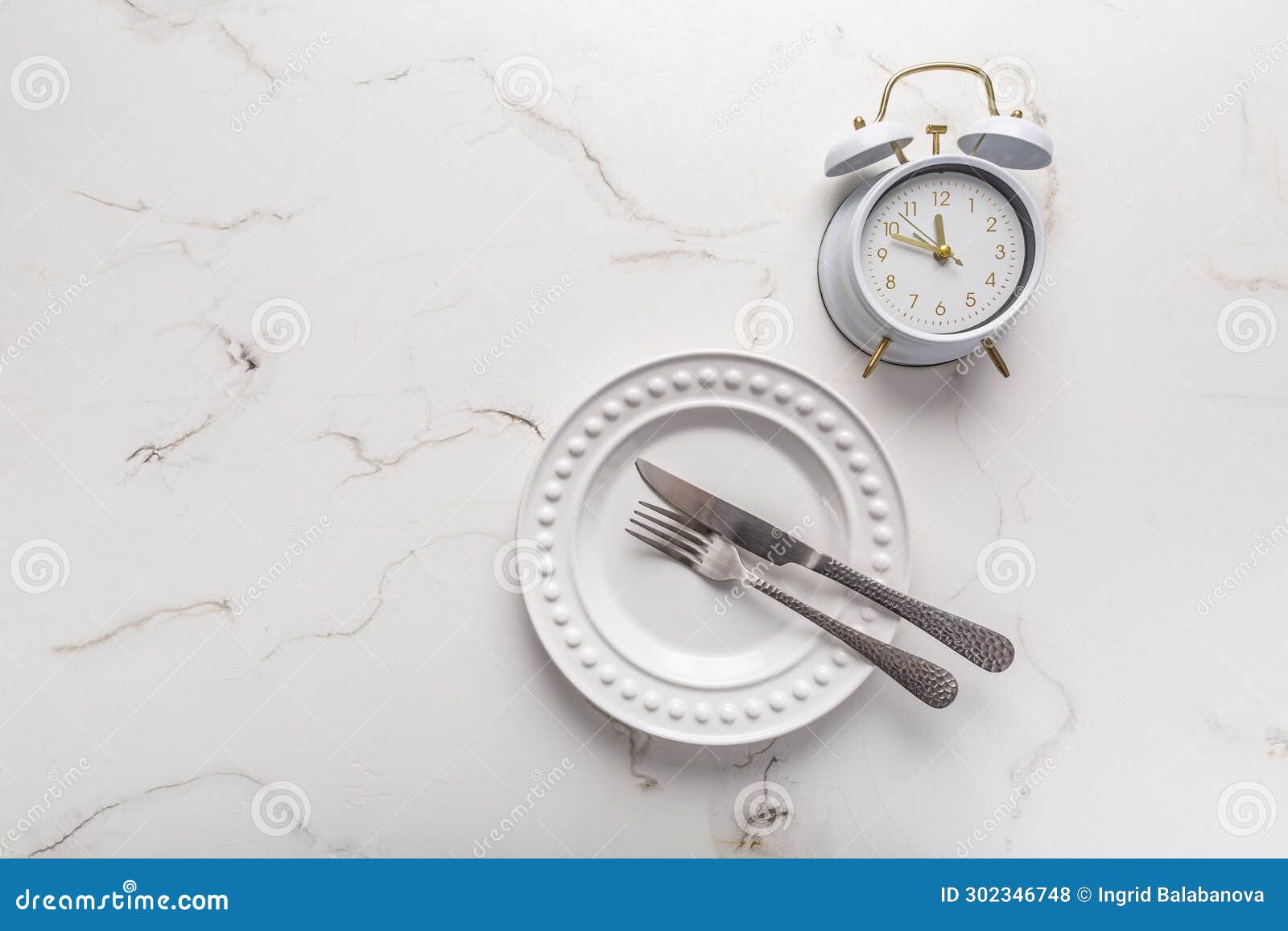 Concept of Intermittent Fasting, Empty Plate with Clock Stock Photo ...