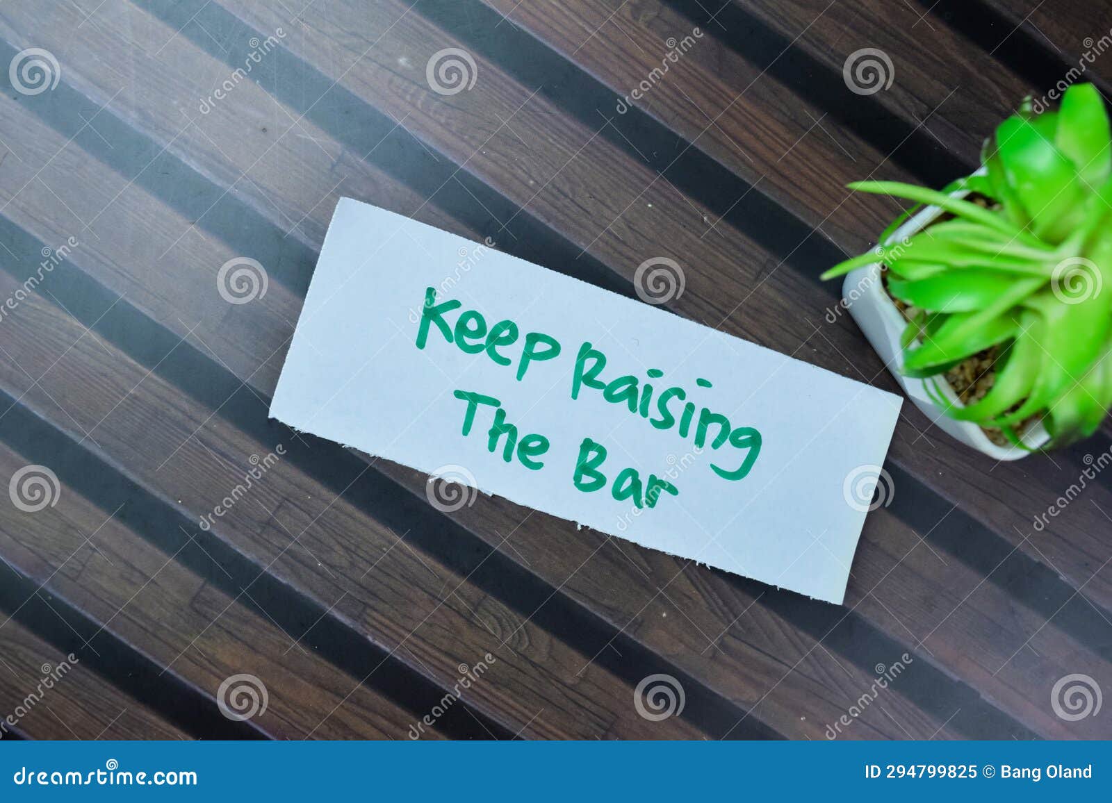 Concept of Keep Raising the Bar Write on Sticky Notes Isolated on ...