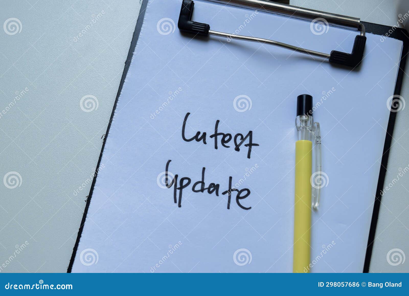 Concept of Latest Update Write on Sticky Notes Isolated on Wooden Table ...