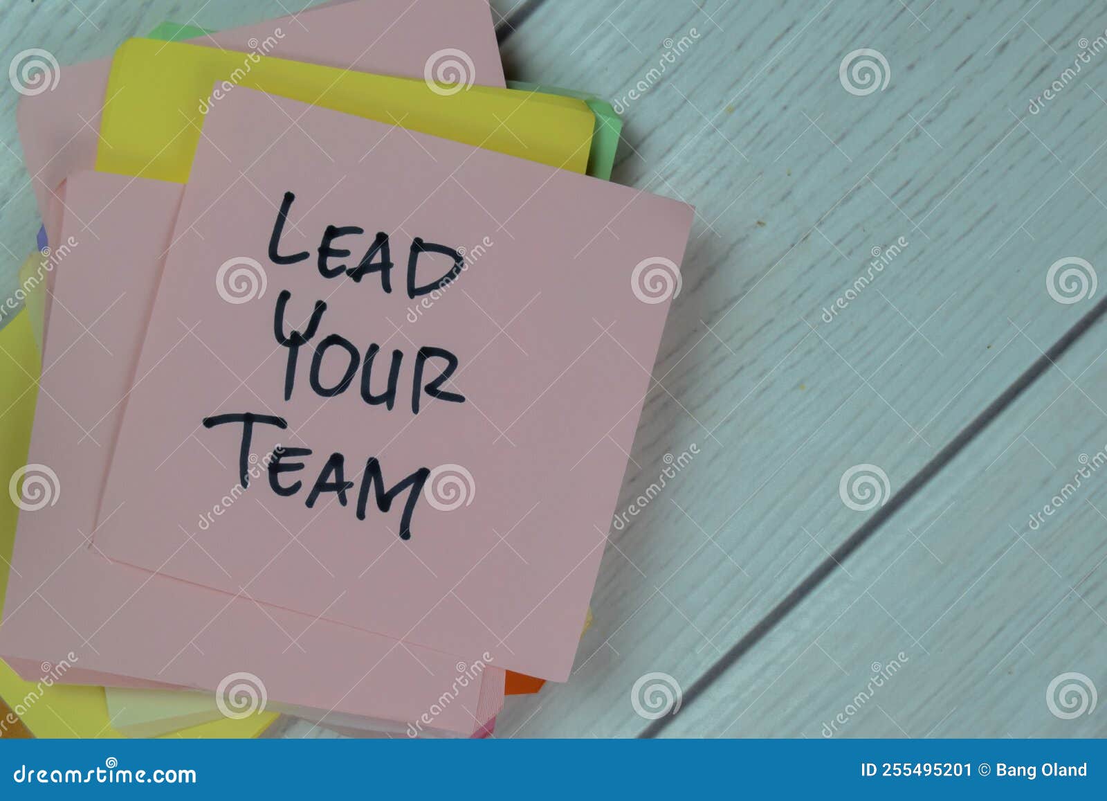 Concept of Lead Your Team Write on Sticky Notes Isolated on Wooden ...