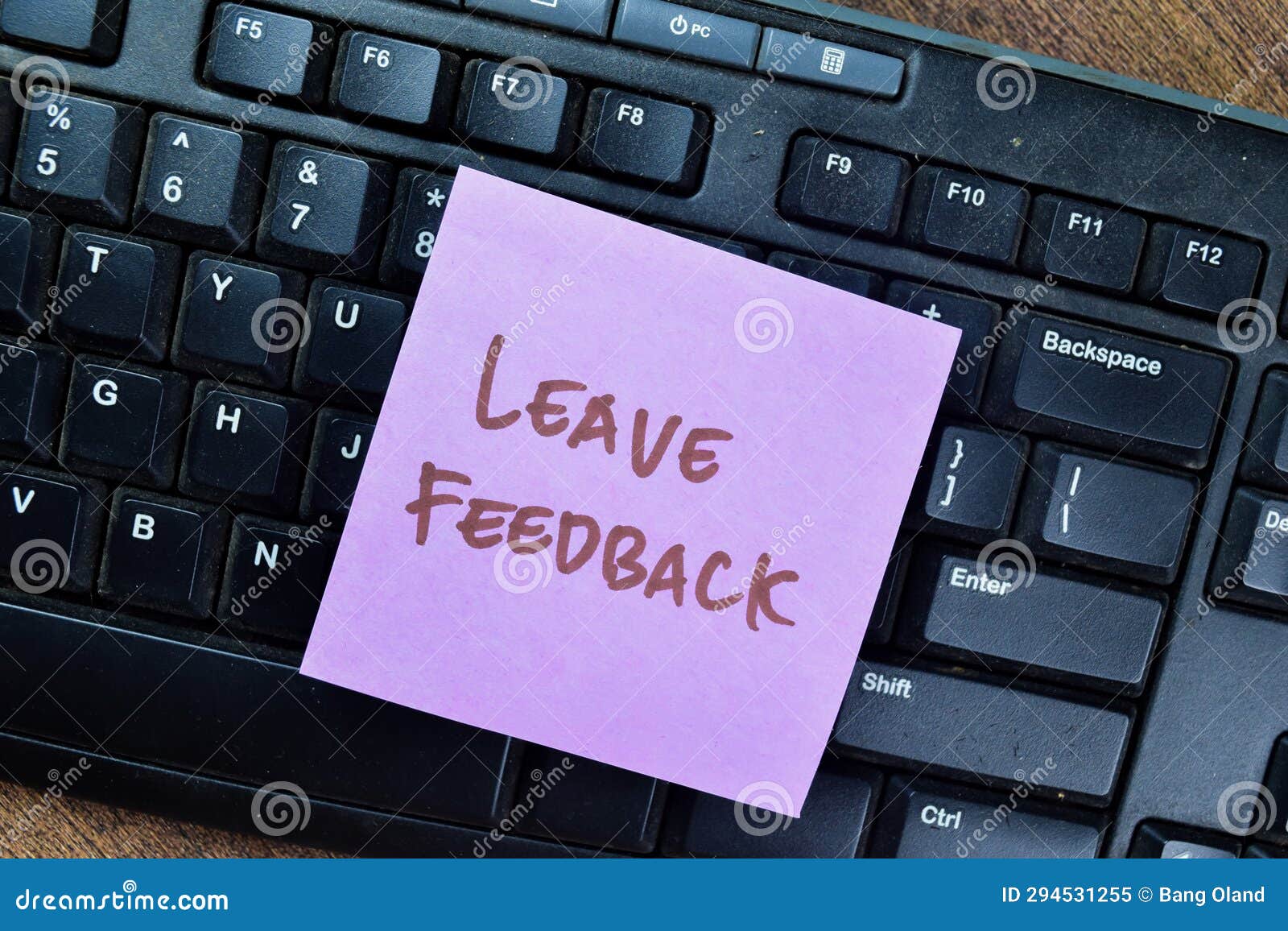 Concept of Leave Feedback Write on Sticky Notes Isolated on Wooden ...