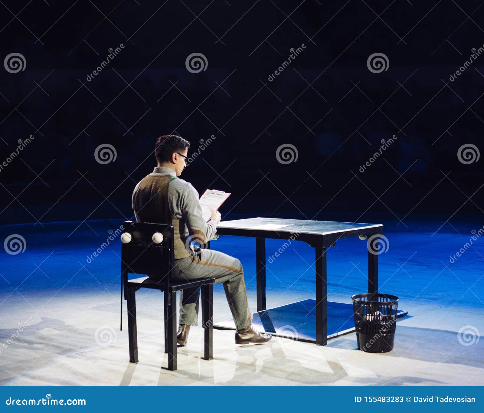 Concept. a Lone Office Worker Sits in a Dark Room. Stock Image - Image ...