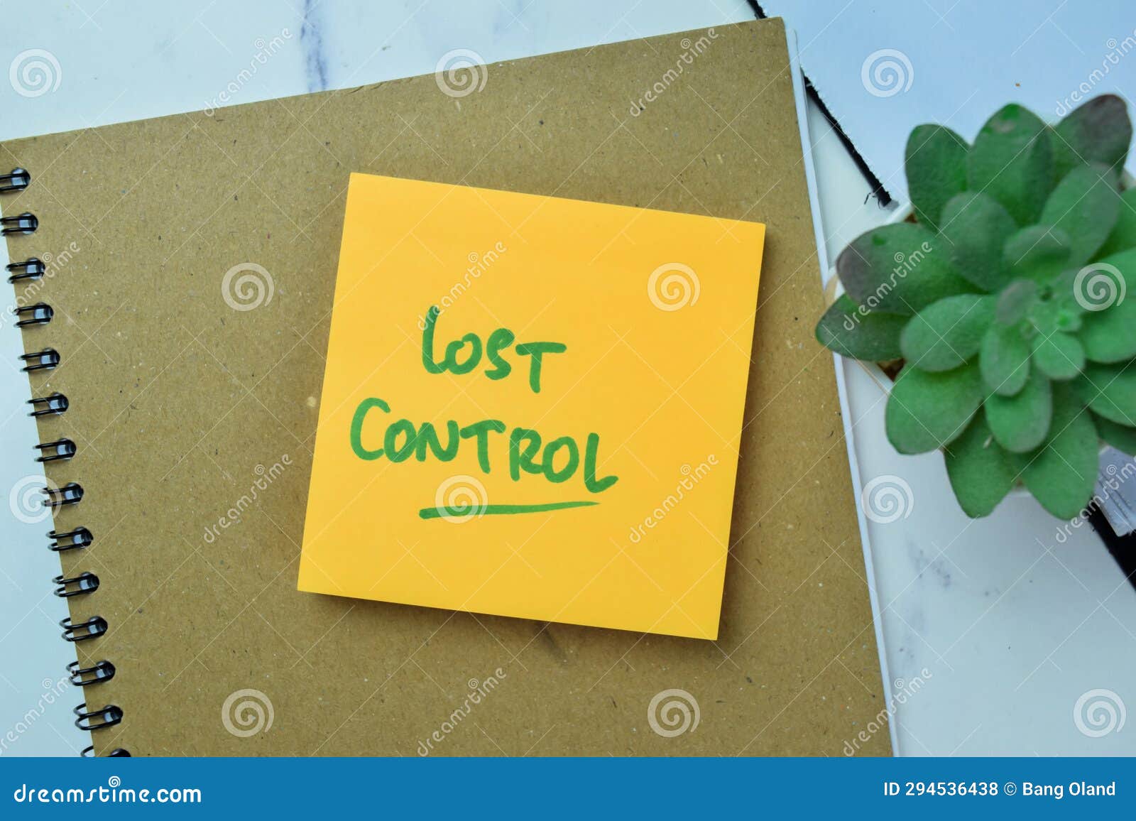 Concept of Lost Control Write on Sticky Notes Isolated on Wooden Table ...
