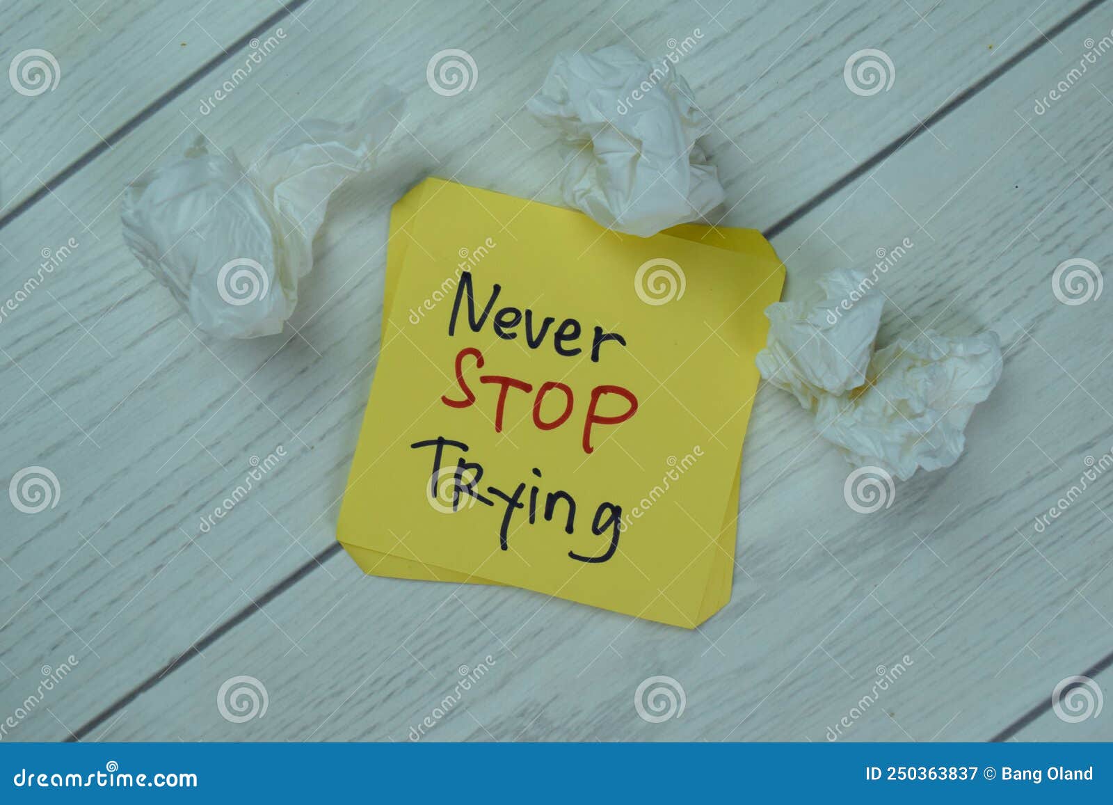 Concept of Never Stop Trying Write on Sticky Notes Isolated on Wooden ...