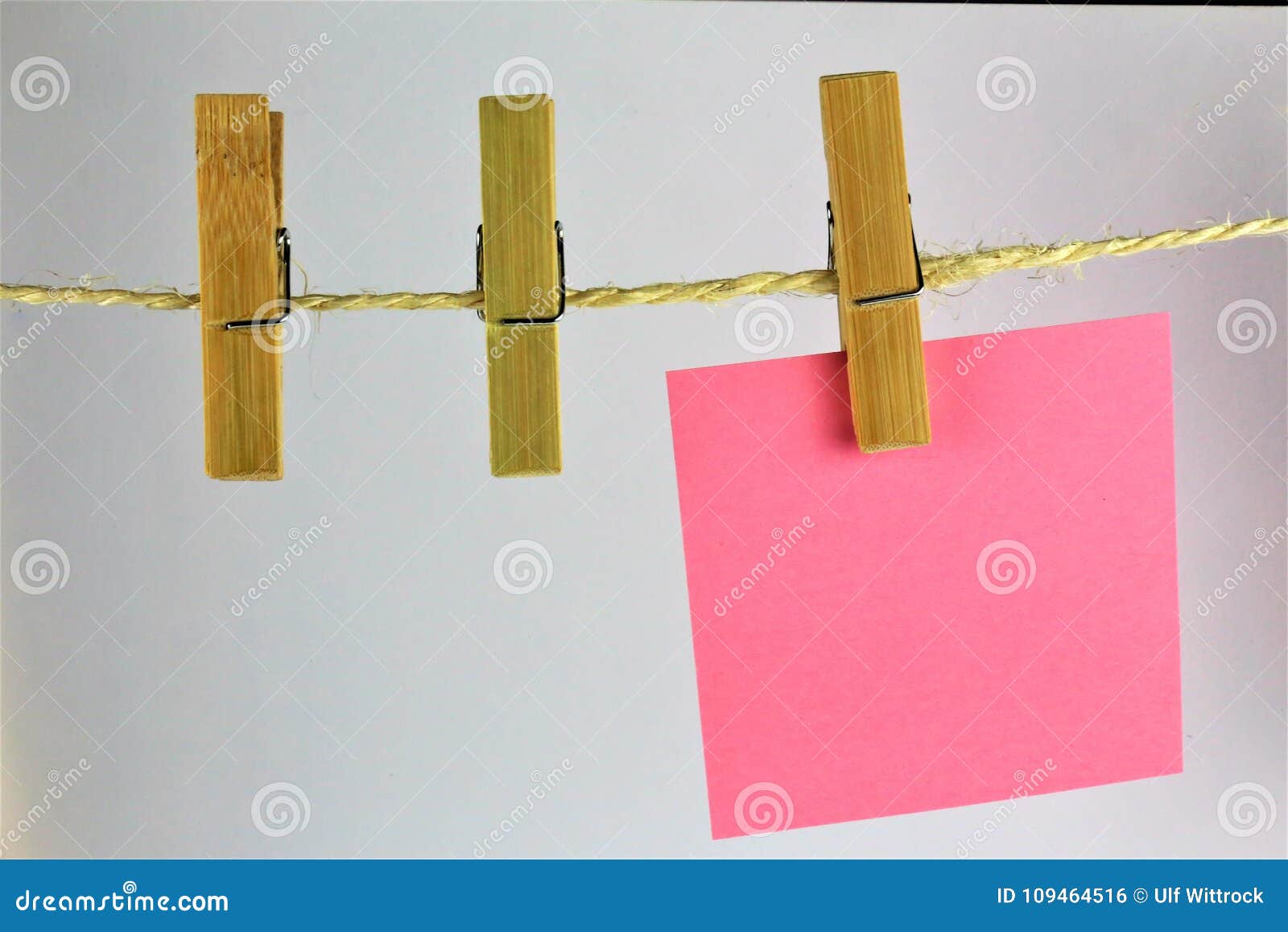 An Concept of a Note with a Clothespin with Copy Space Stock Photo ...