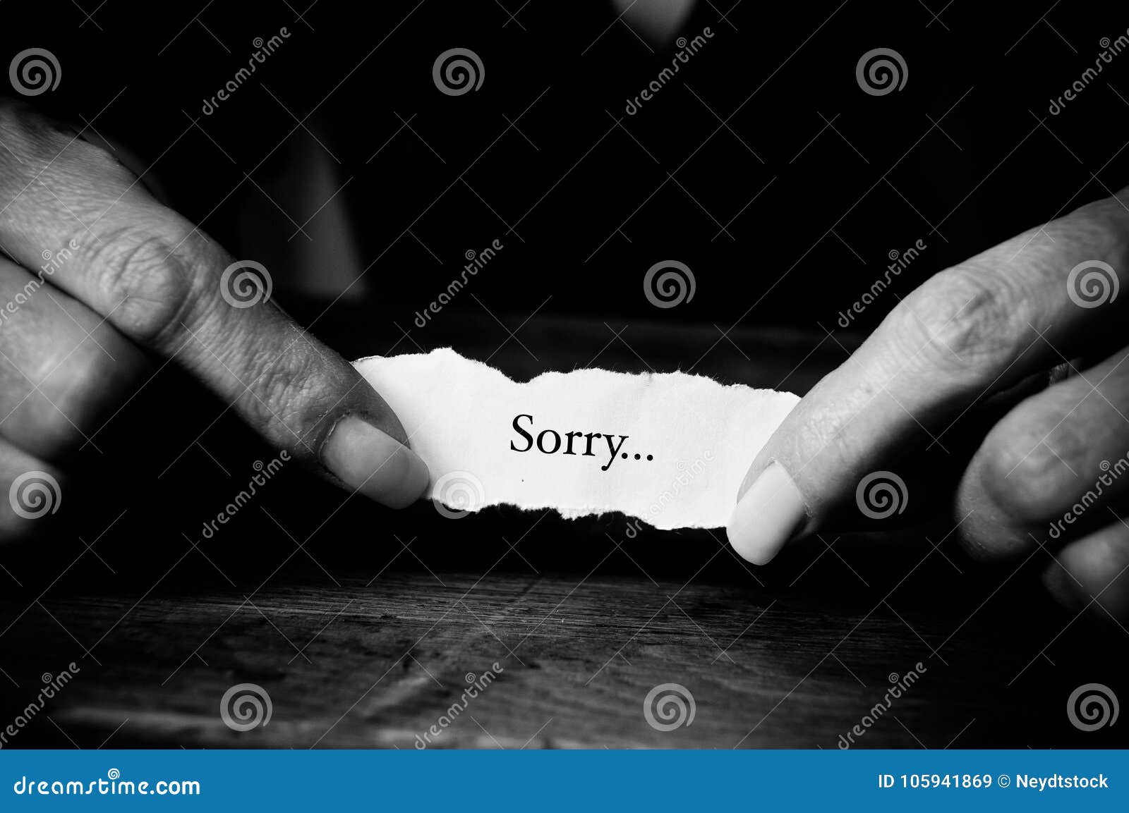 Concept Paper in Hands - Sorry... Stock Image - Image of paper, black ...