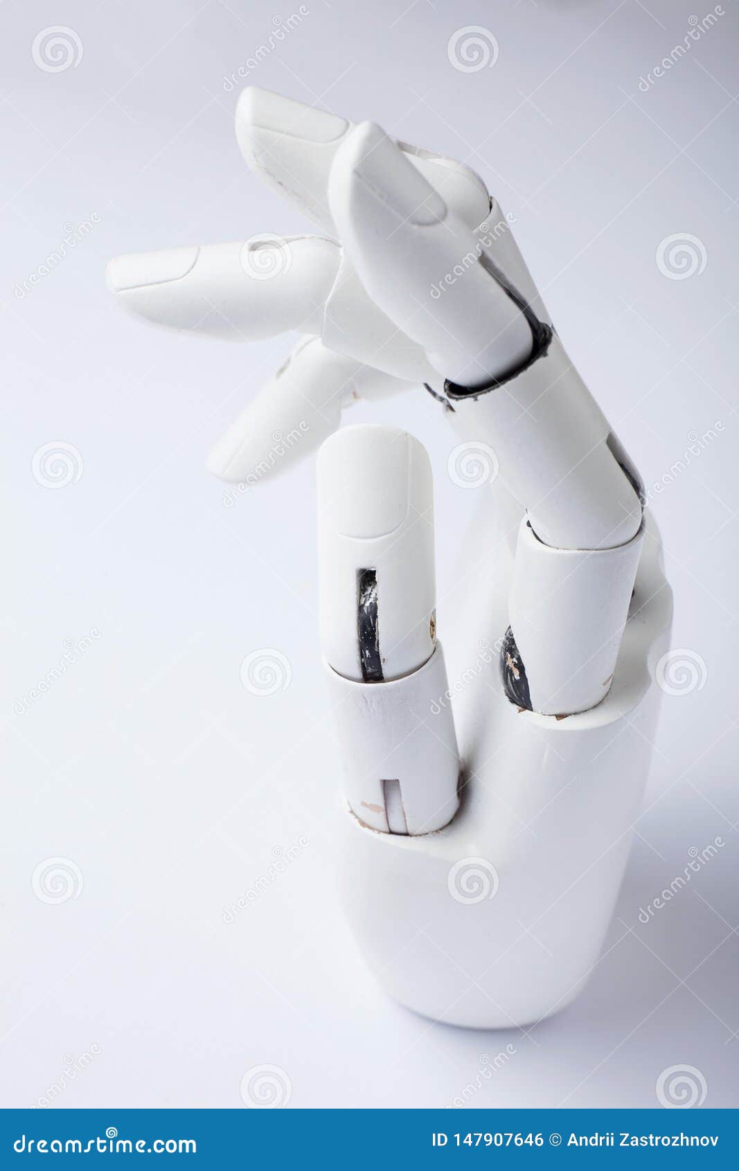 The Concept of a Prosthetic Hand on a White Background, Vertically ...