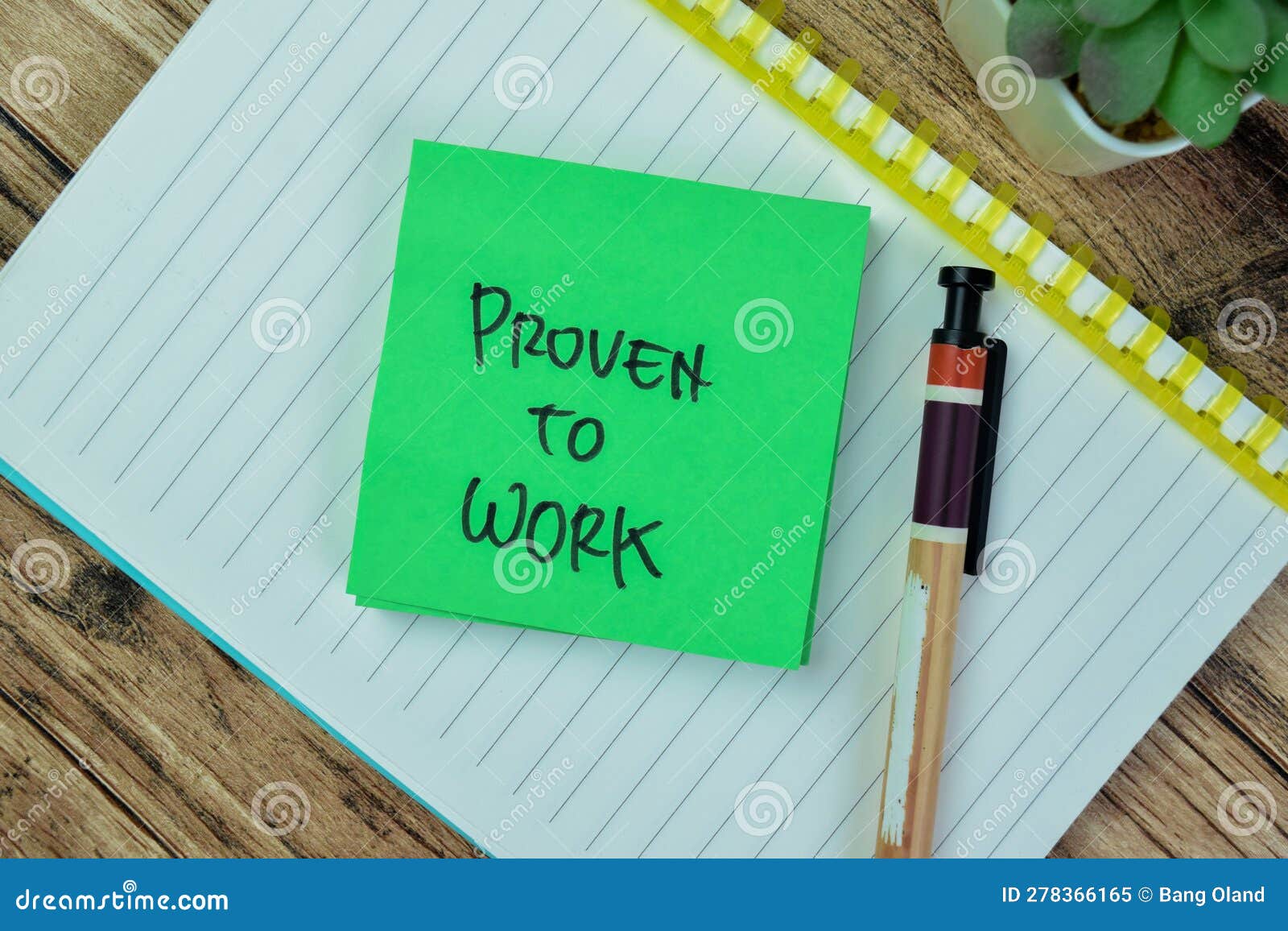 Concept Of Proven To Work Write On Sticky Notes Isolated On Wooden