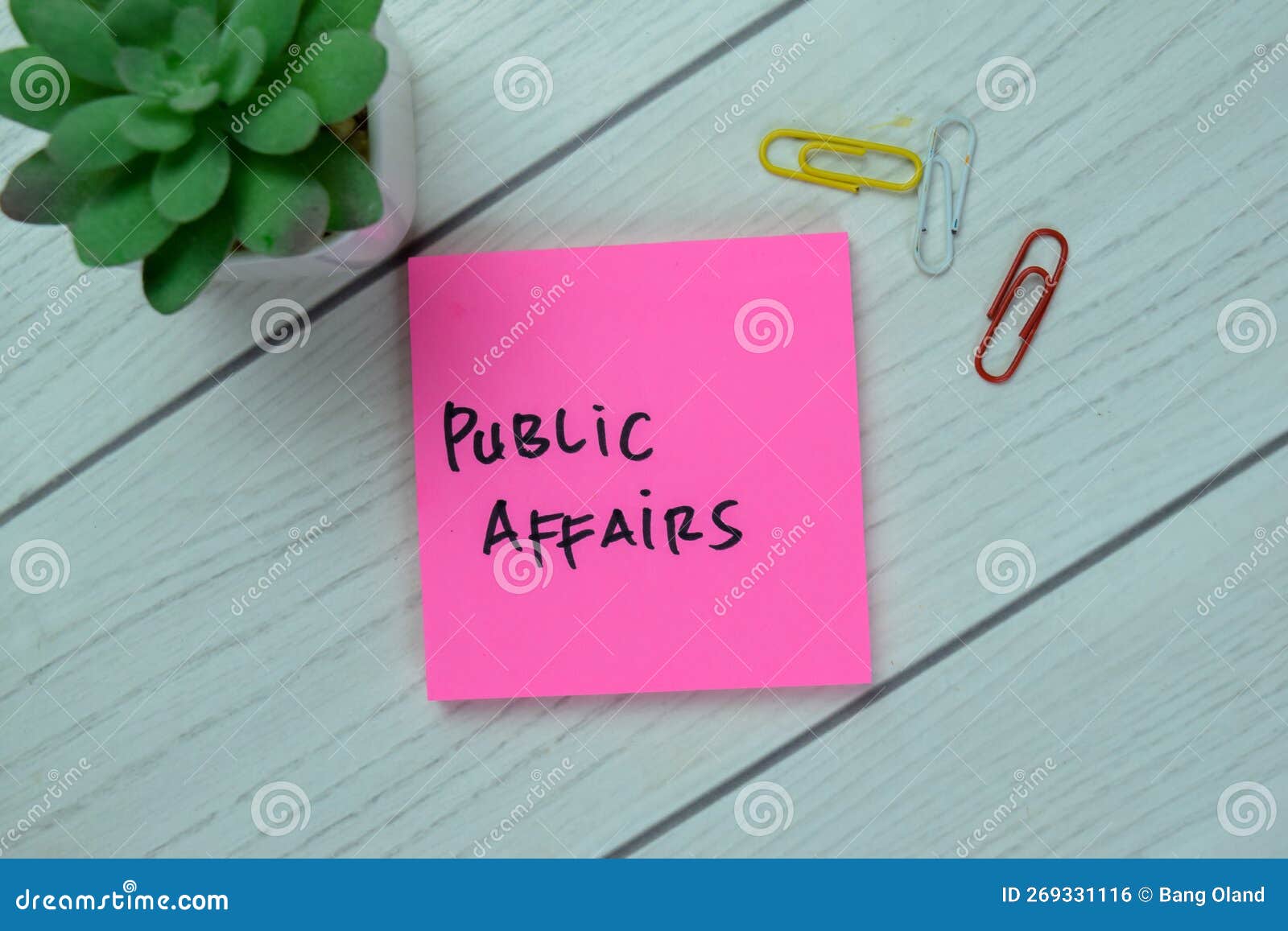 Concept Of Public Affairs Write On Sticky Notes Isolated On Wooden