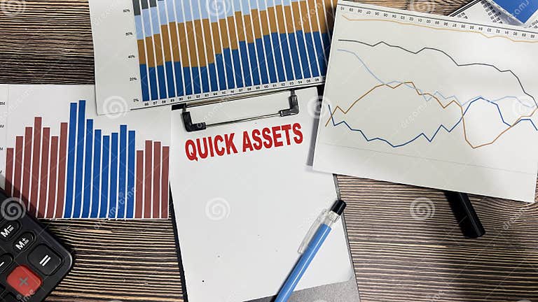 Concept of Quick Assets Write on Paperwork Isolated on Wooden Table ...