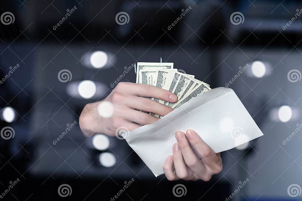 The Concept of Receiving Wages in an Envelope Stock Photo - Image of ...