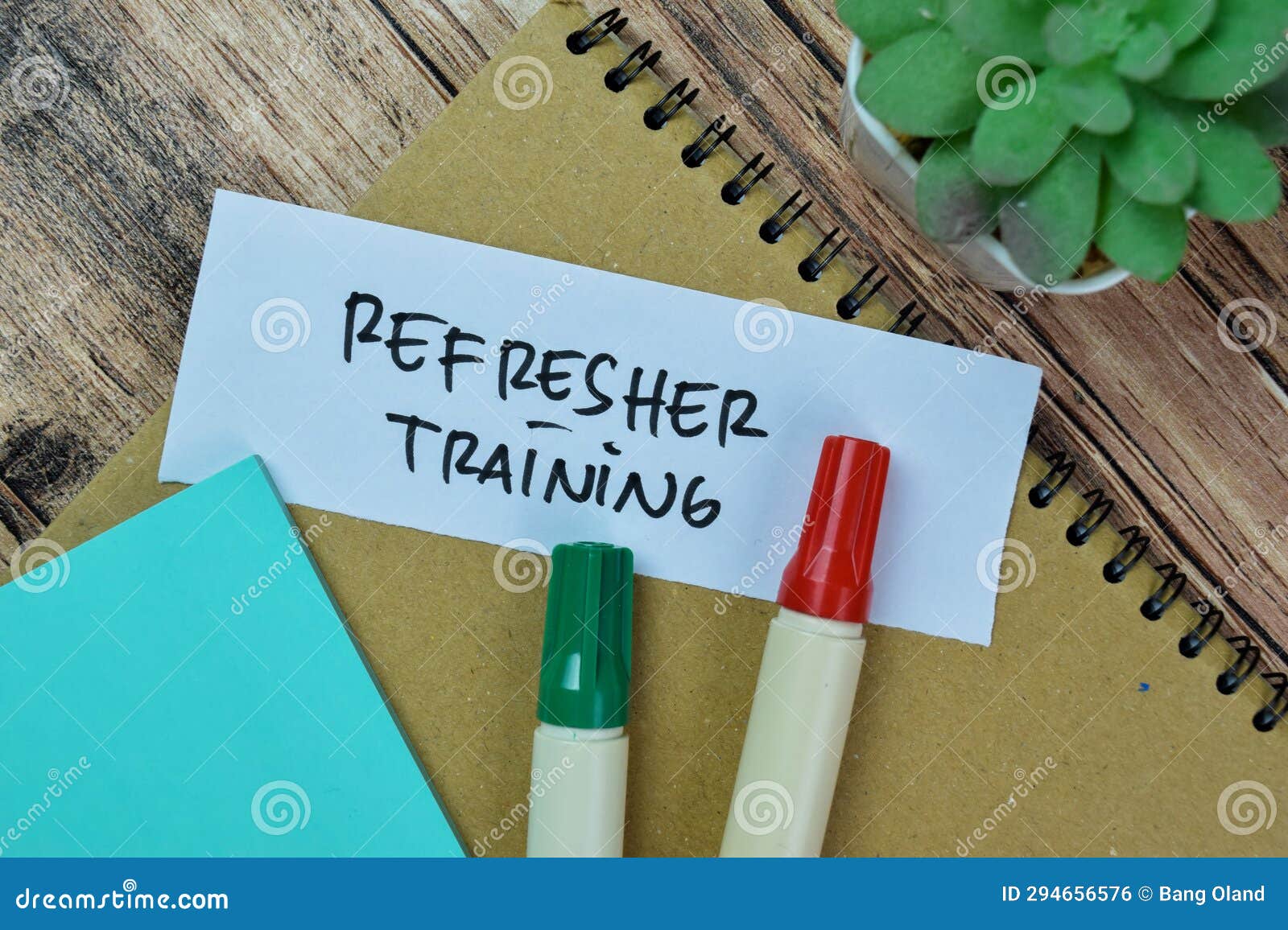 Concept of Refresher Training Write on Sticky Notes Isolated on Wooden ...