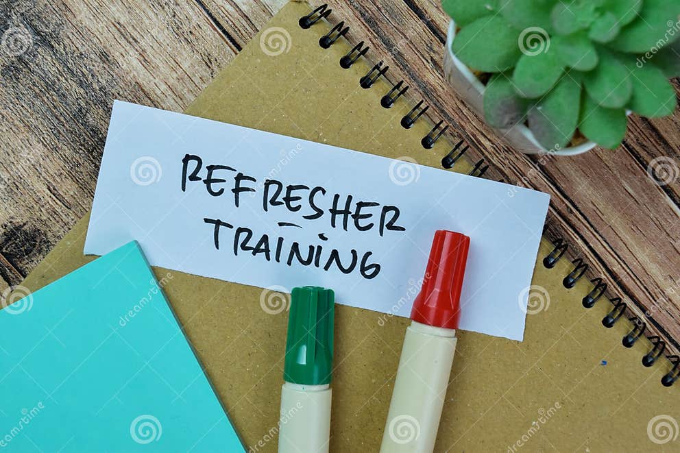 Concept of Refresher Training Write on Sticky Notes Isolated on Wooden ...