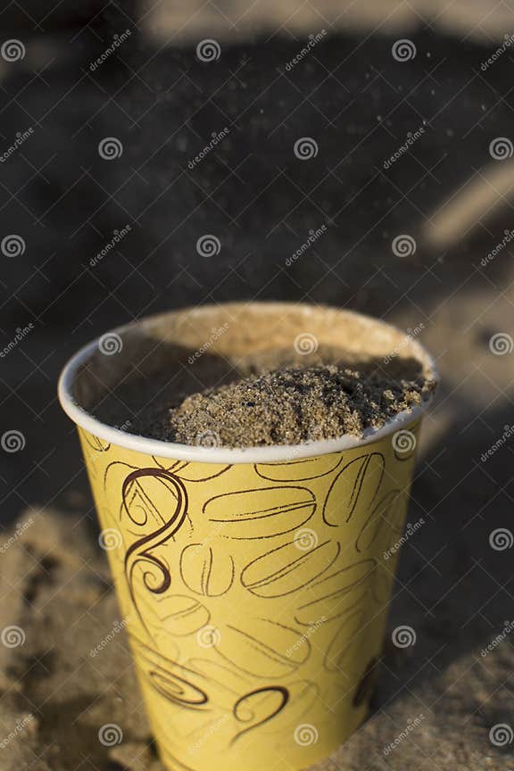 Concept with Sand and Paper Cup on the Beach. Stock Image - Image of ...