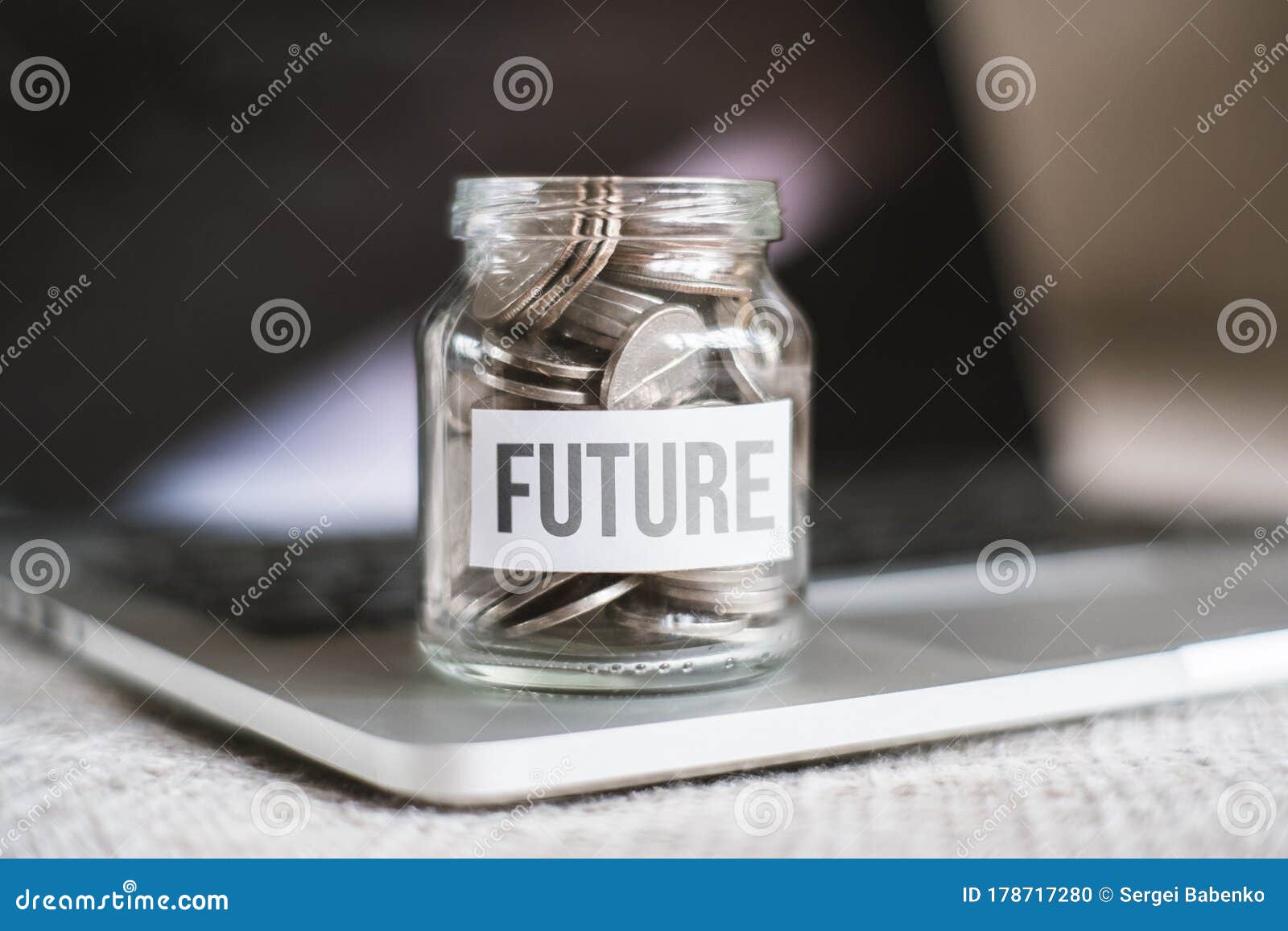 The Concept of Saving Money for the Future - a Glass Jar with Coins ...