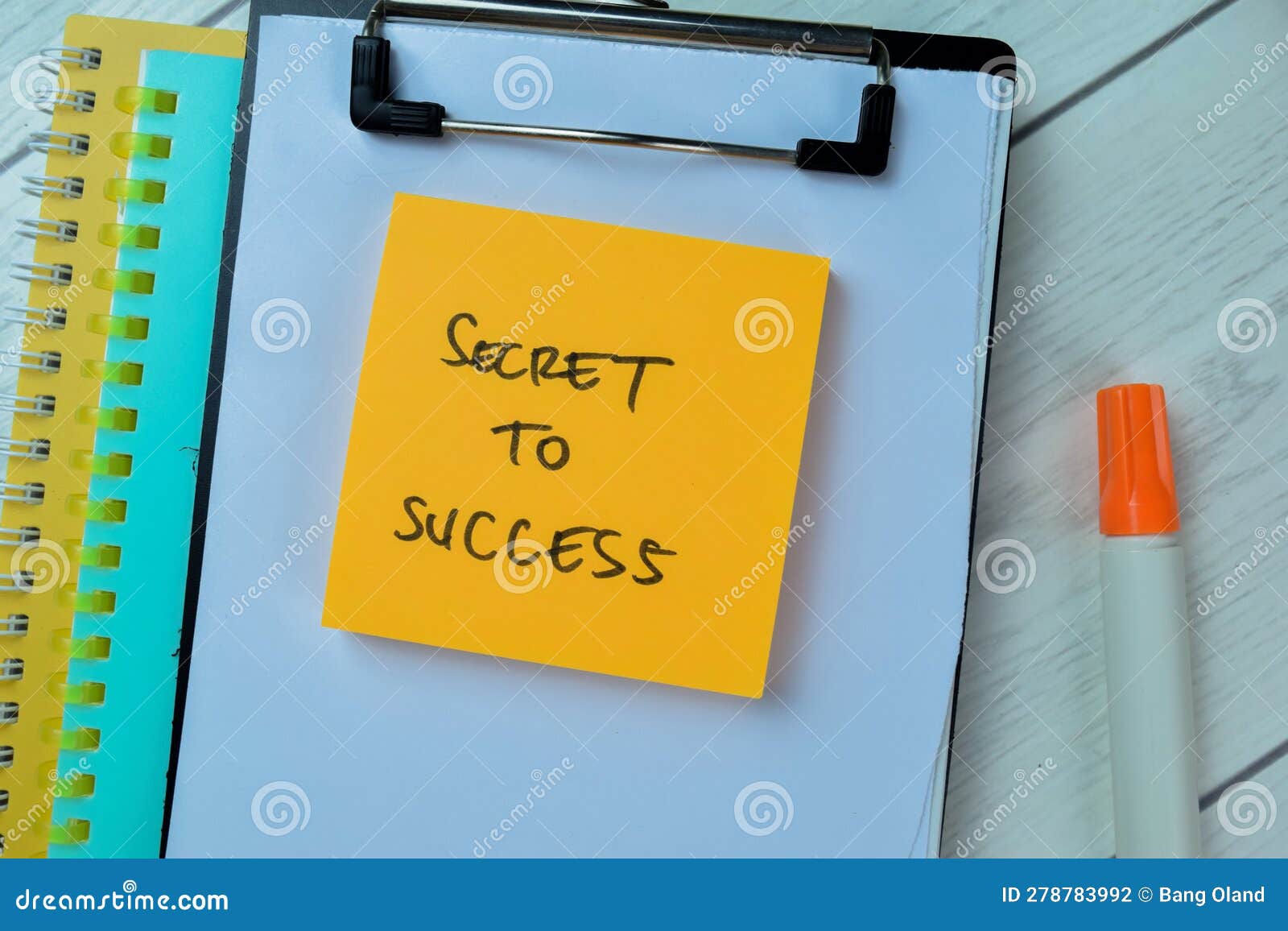 Concept Of Secret To Success Write On Sticky Notes Isolated On Wooden