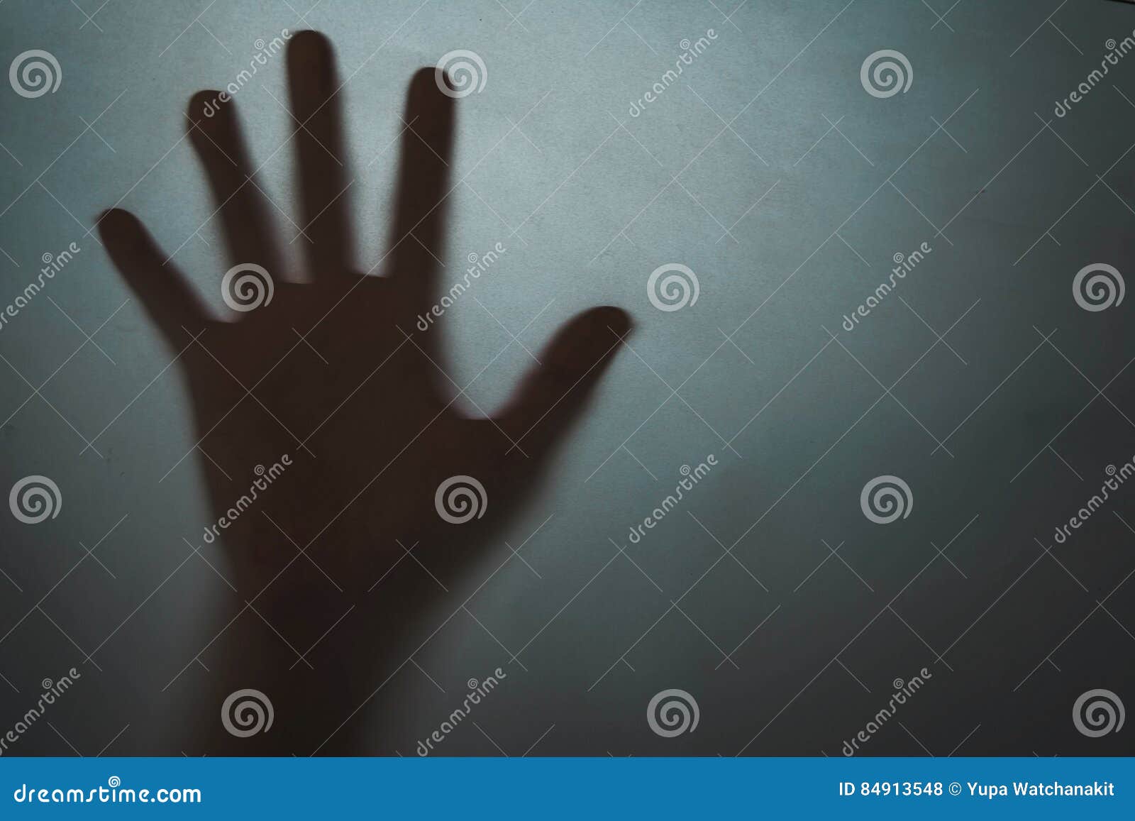 The Concept of the Shadow of Hand Behind Paper, Illuminated from Stock ...