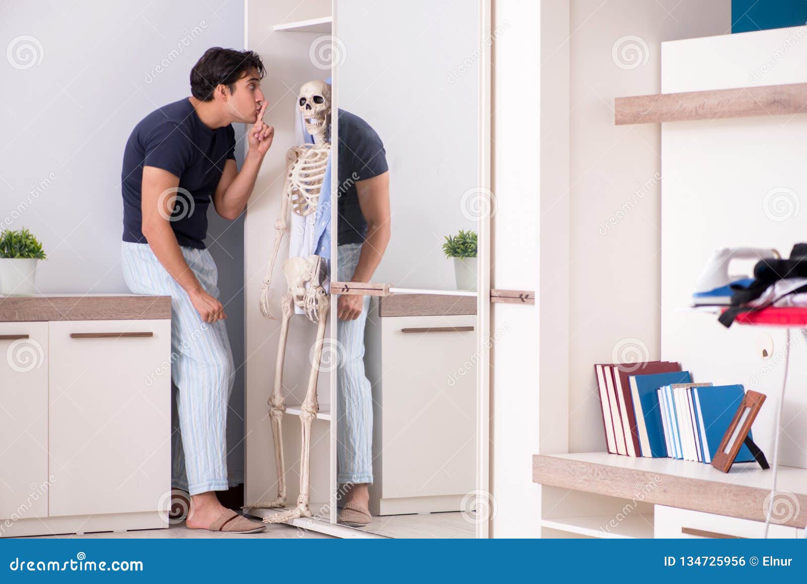 The Concept of Skeleton in the Cupboard or Closet Stock Photo - Image ...