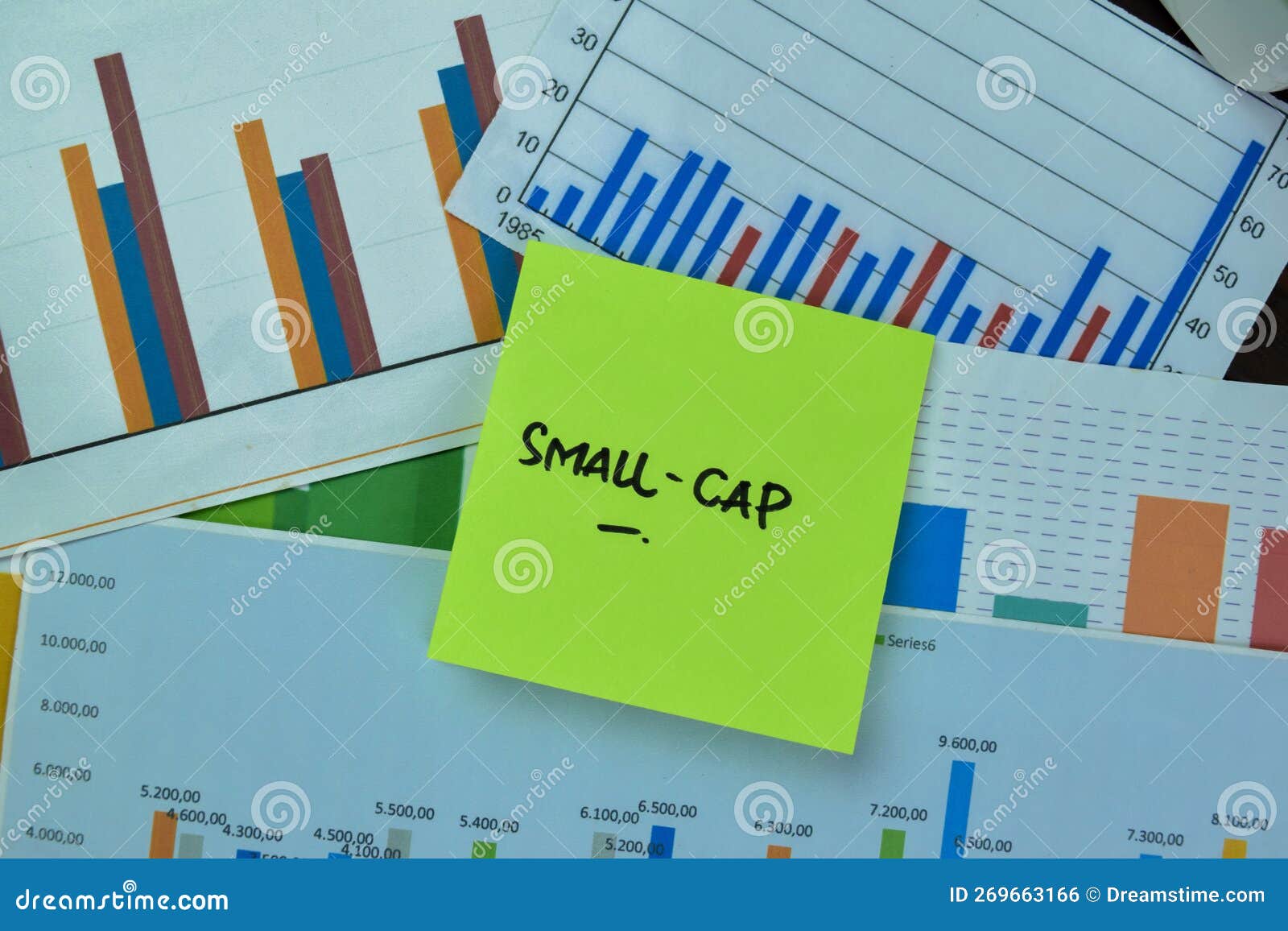 Concept of Small-cap Write on Sticky Notes Isolated on Wooden Table ...