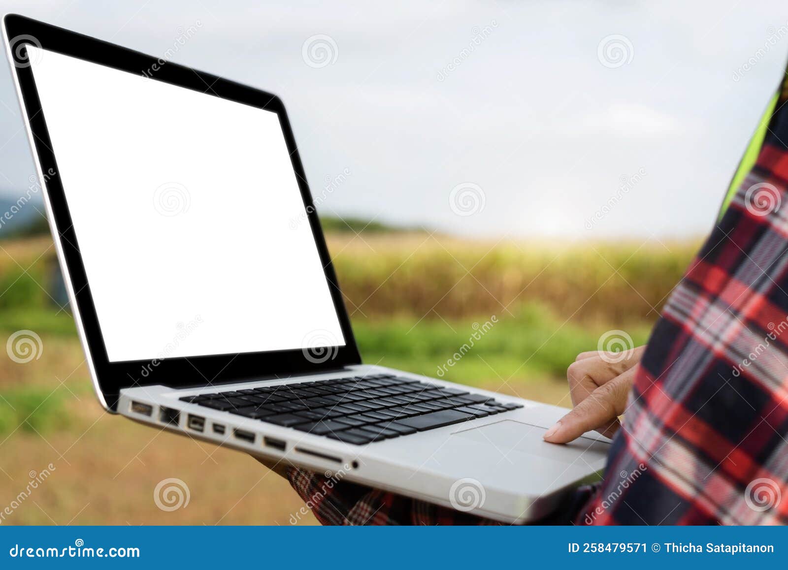 Concept of Smart Farmer Using Laptop Computer in the Field Garden with ...
