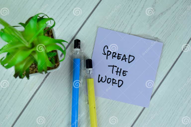 Concept of Spread the Word Write on Sticky Notes Isolated on Wooden ...